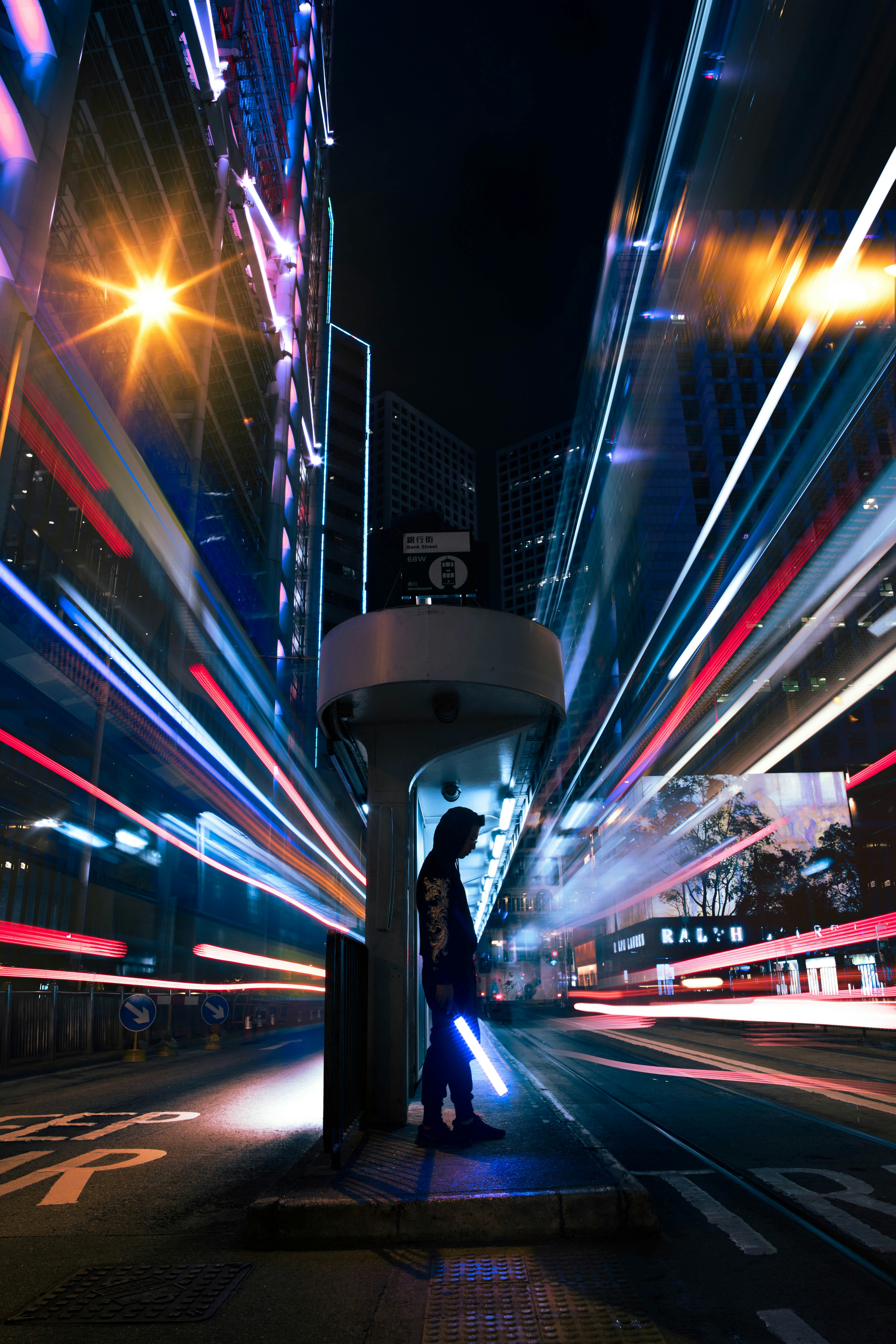 Midnight Neon: Silhouette at the Converging Street