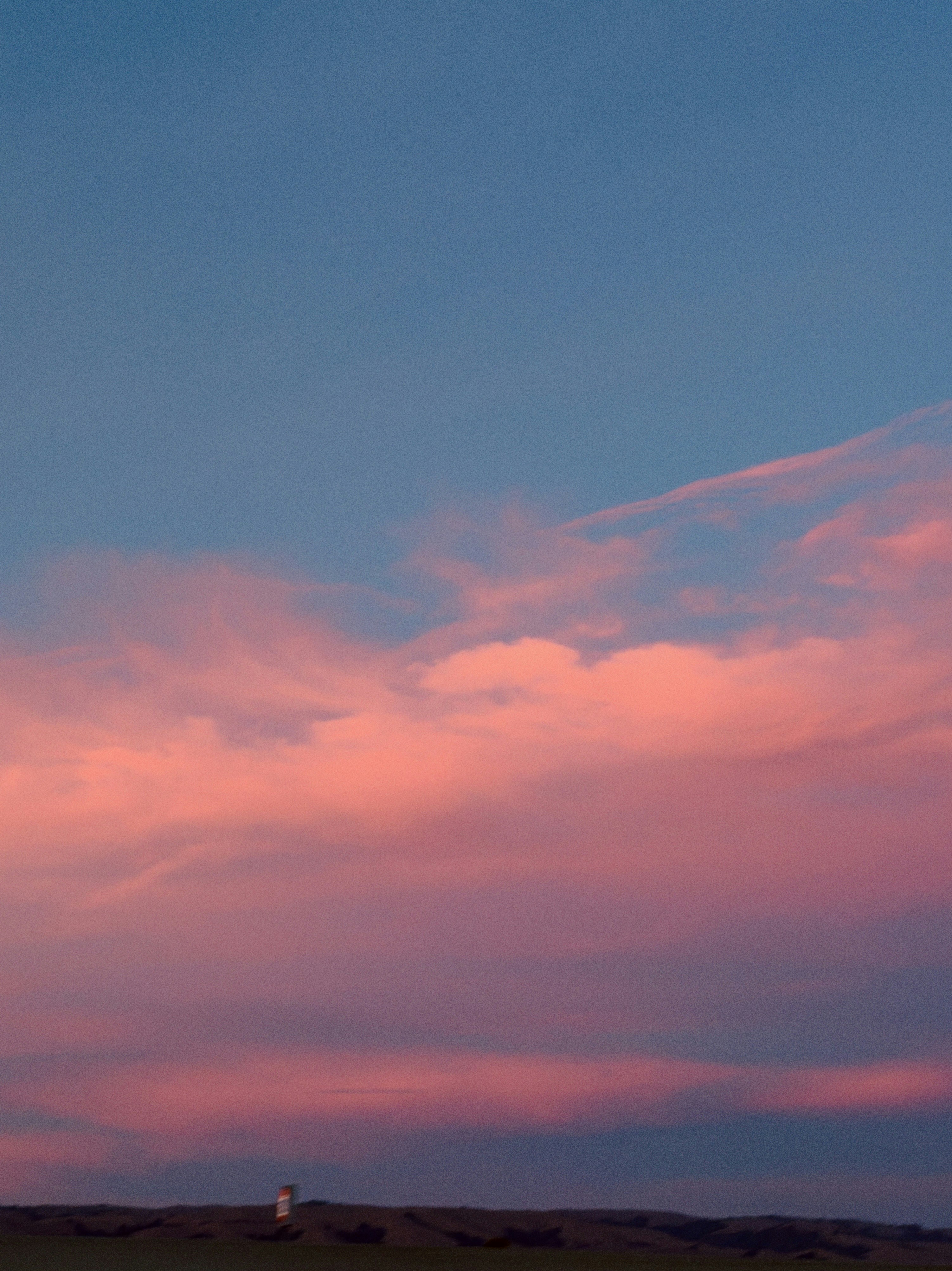 Low Horizon, Pink Sky: Dusk Over a Quiet Plain