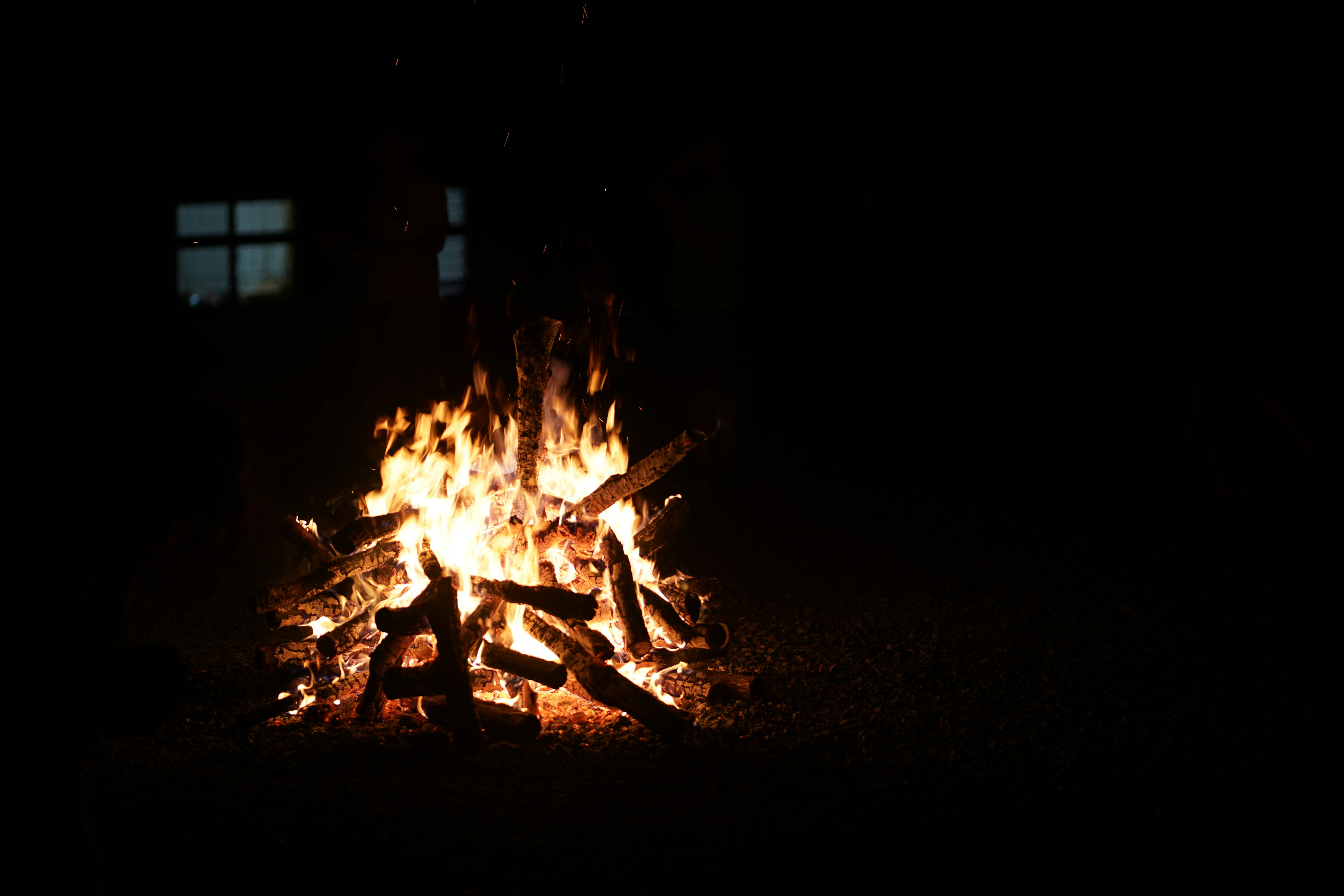 Ember Confluence: Night Campfire with Shrouded Surroundings