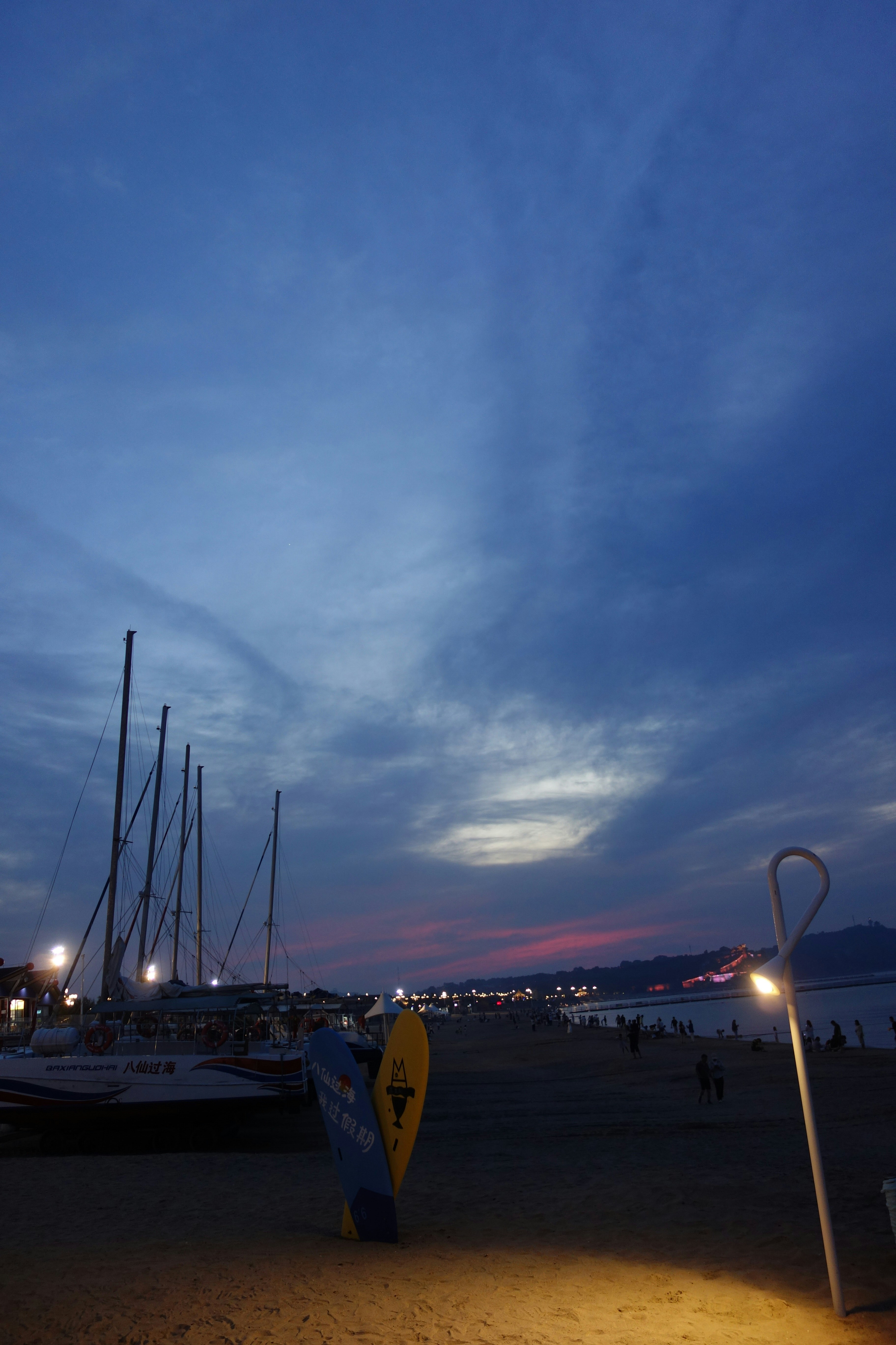 Dusk at the Marina: Boats Silhouetted Against a Blue Hour Sky