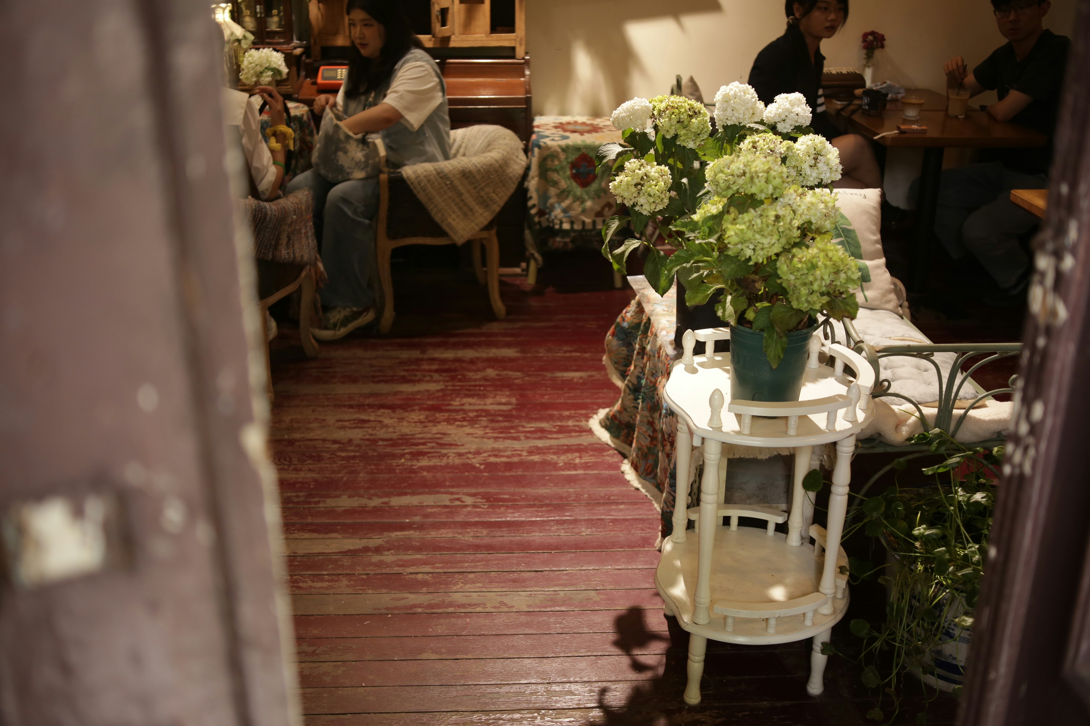 Flower Table in a Cozy Café Corridor