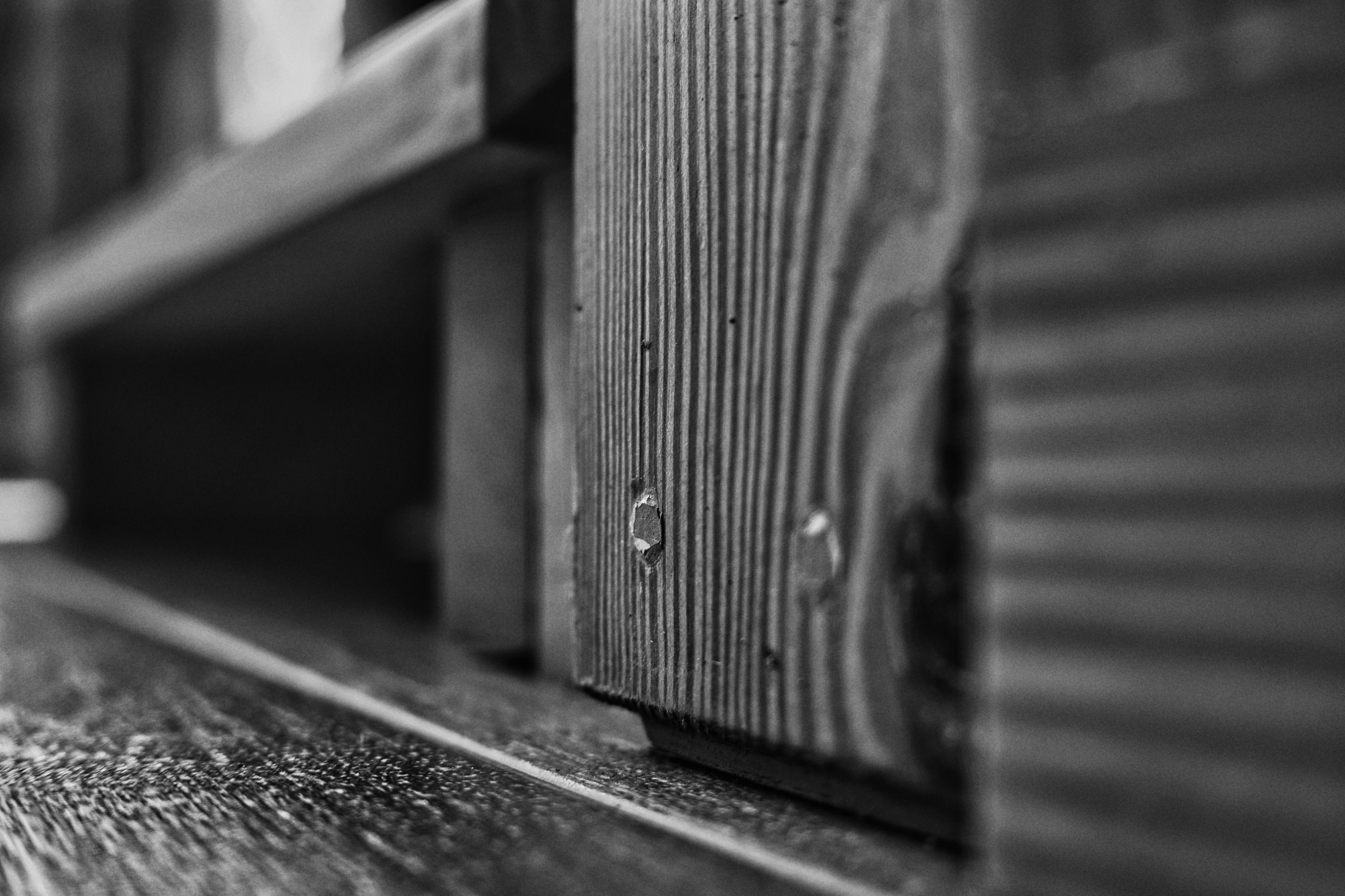 Wooden Platform Edge Meets Corrugated Shadow