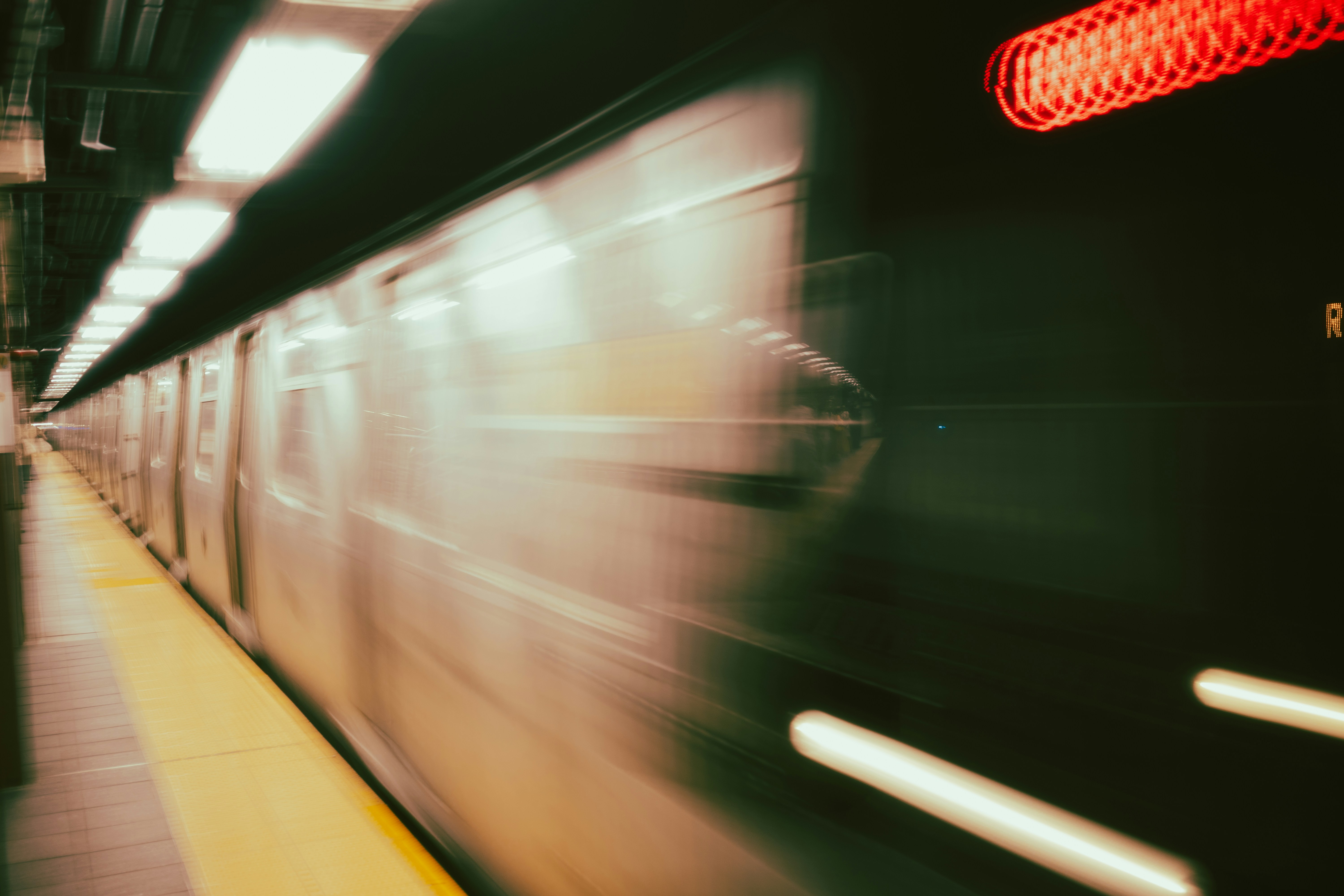 Blurred Transit in Motion: A Subway Streak Through the Underground