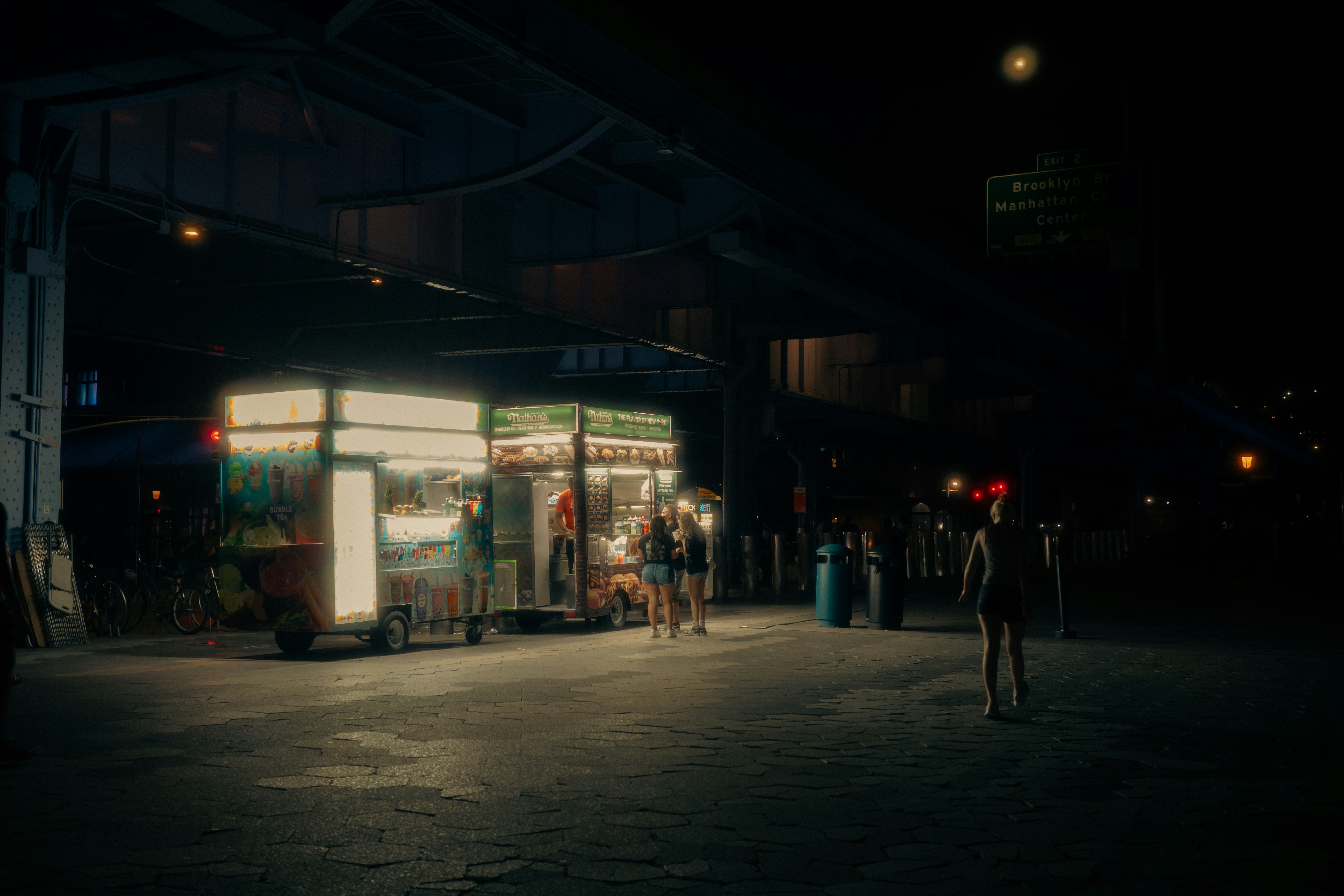Night Market Glow: A Quiet Queue Beneath Neon Steel