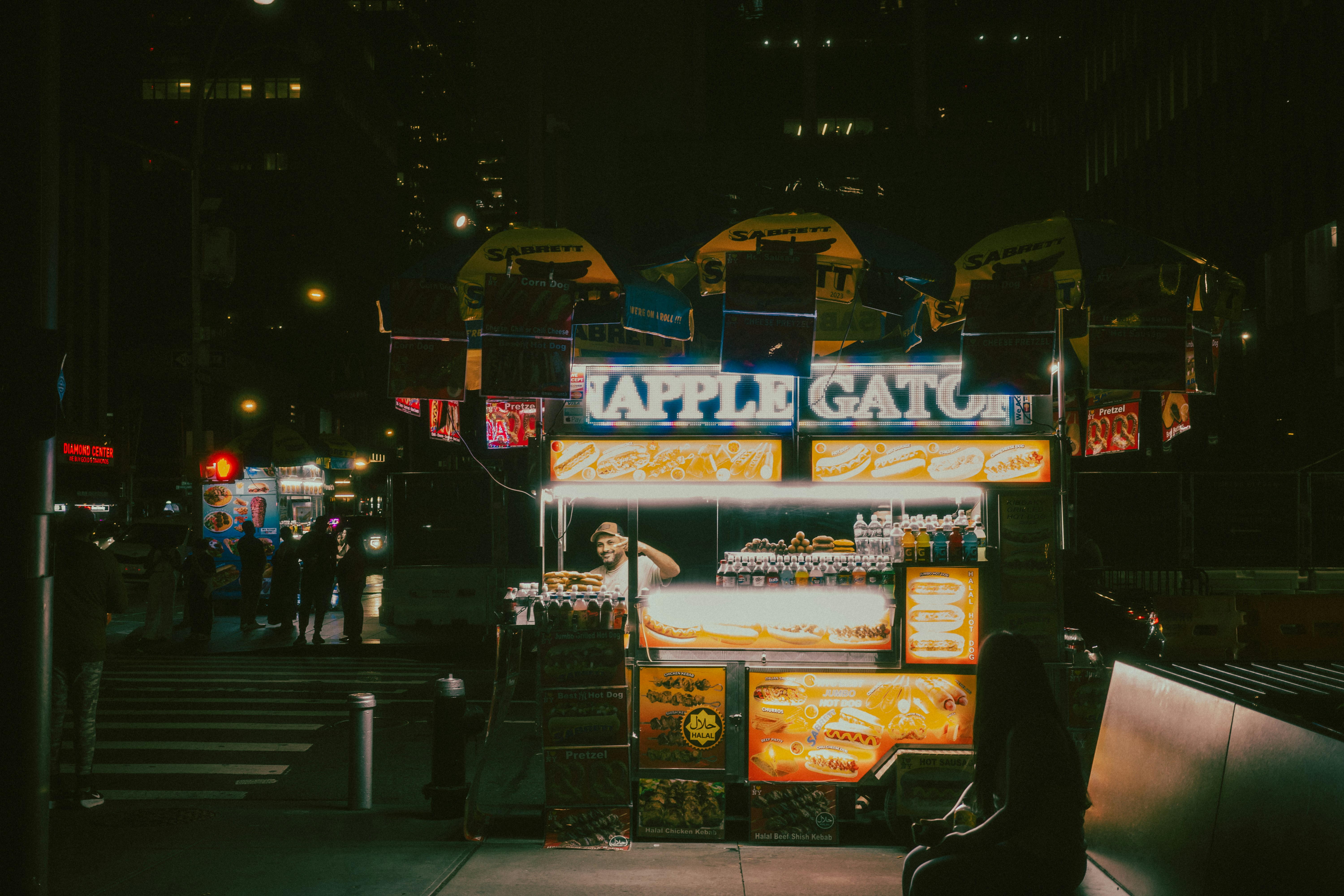 Night Street Snack Stand Beneath Neon Signs
