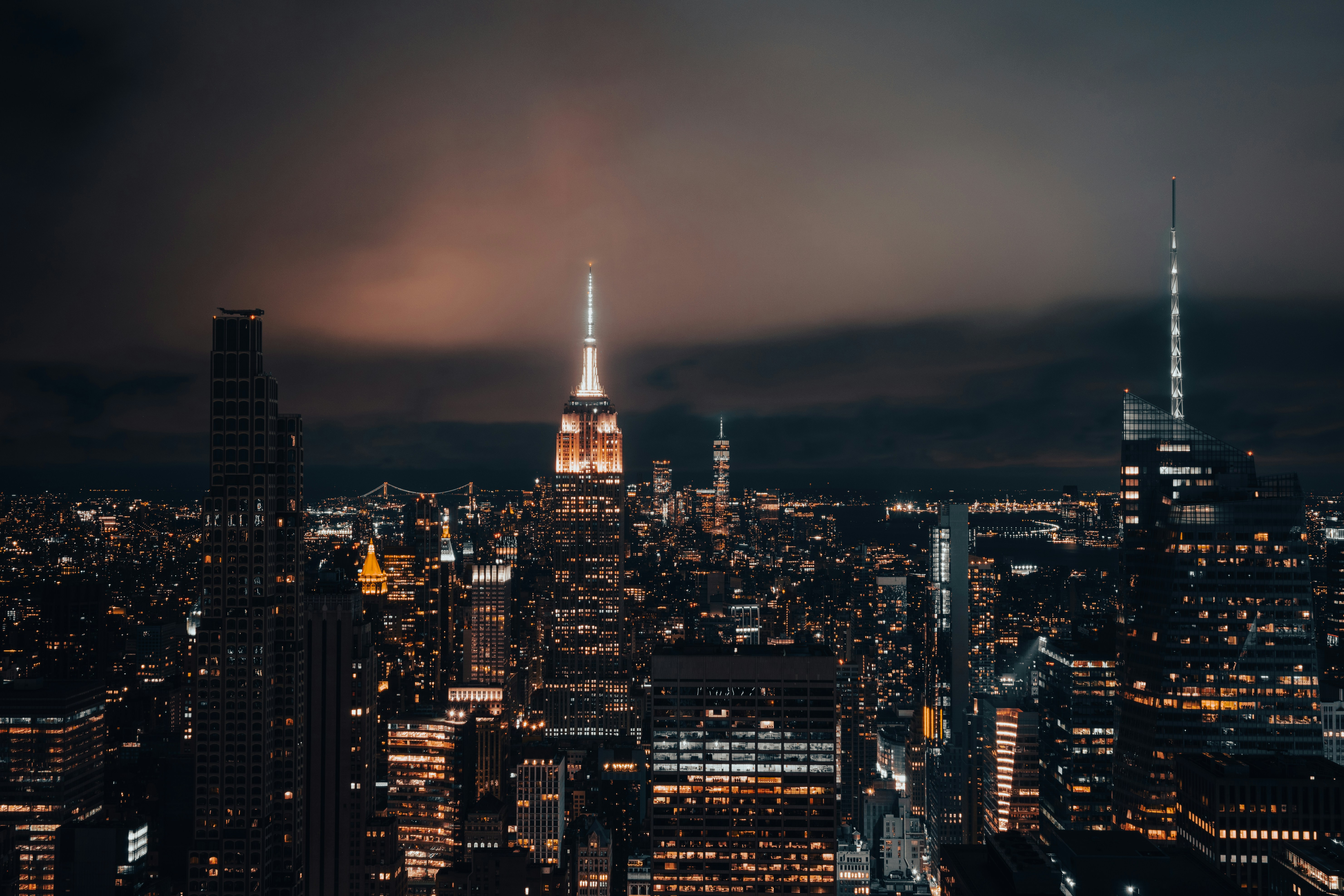 Midnight Apex: City Skyline Crowned by a Electric Needle