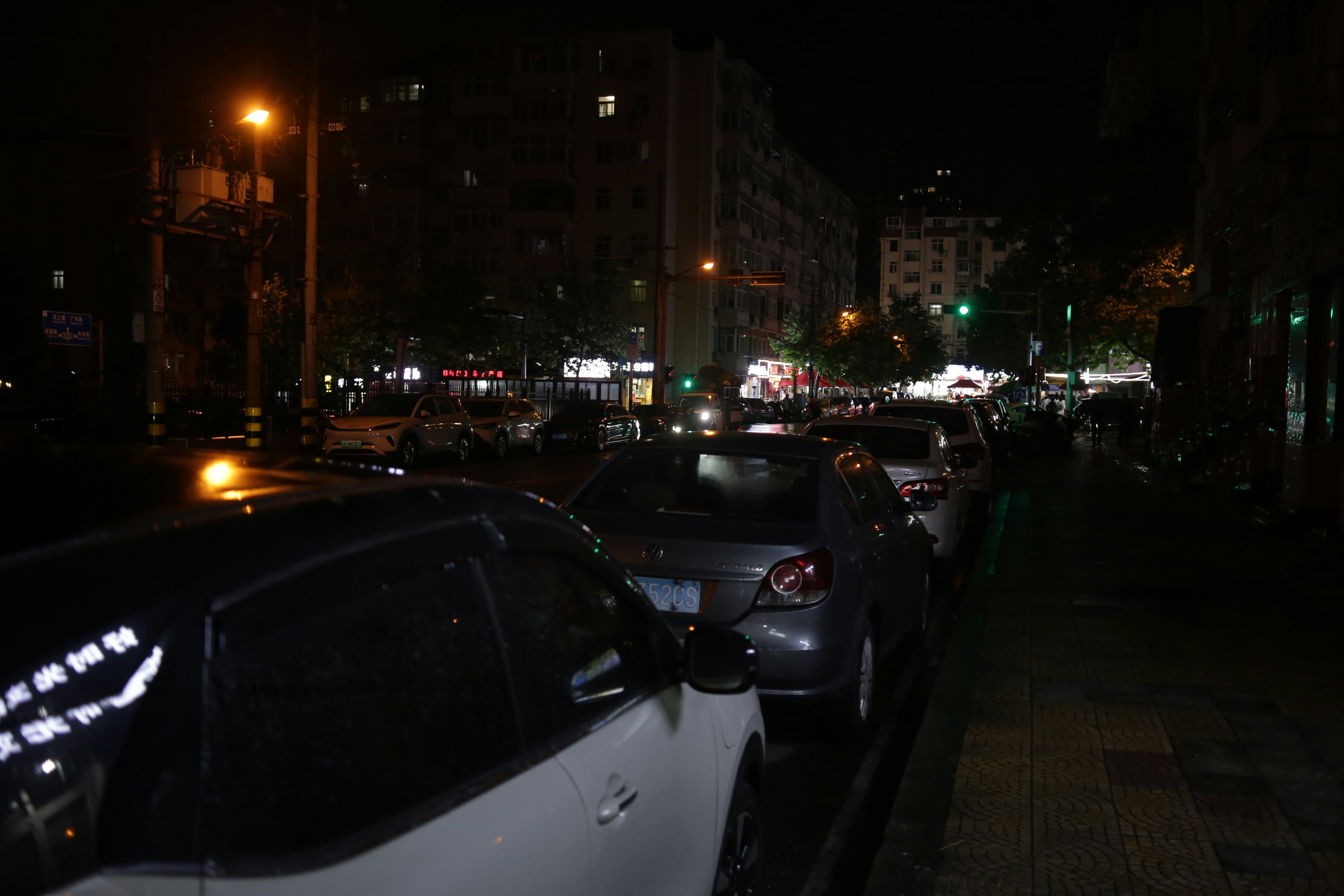 Streetlights and Cars: Nightlife along a Quiet City Block