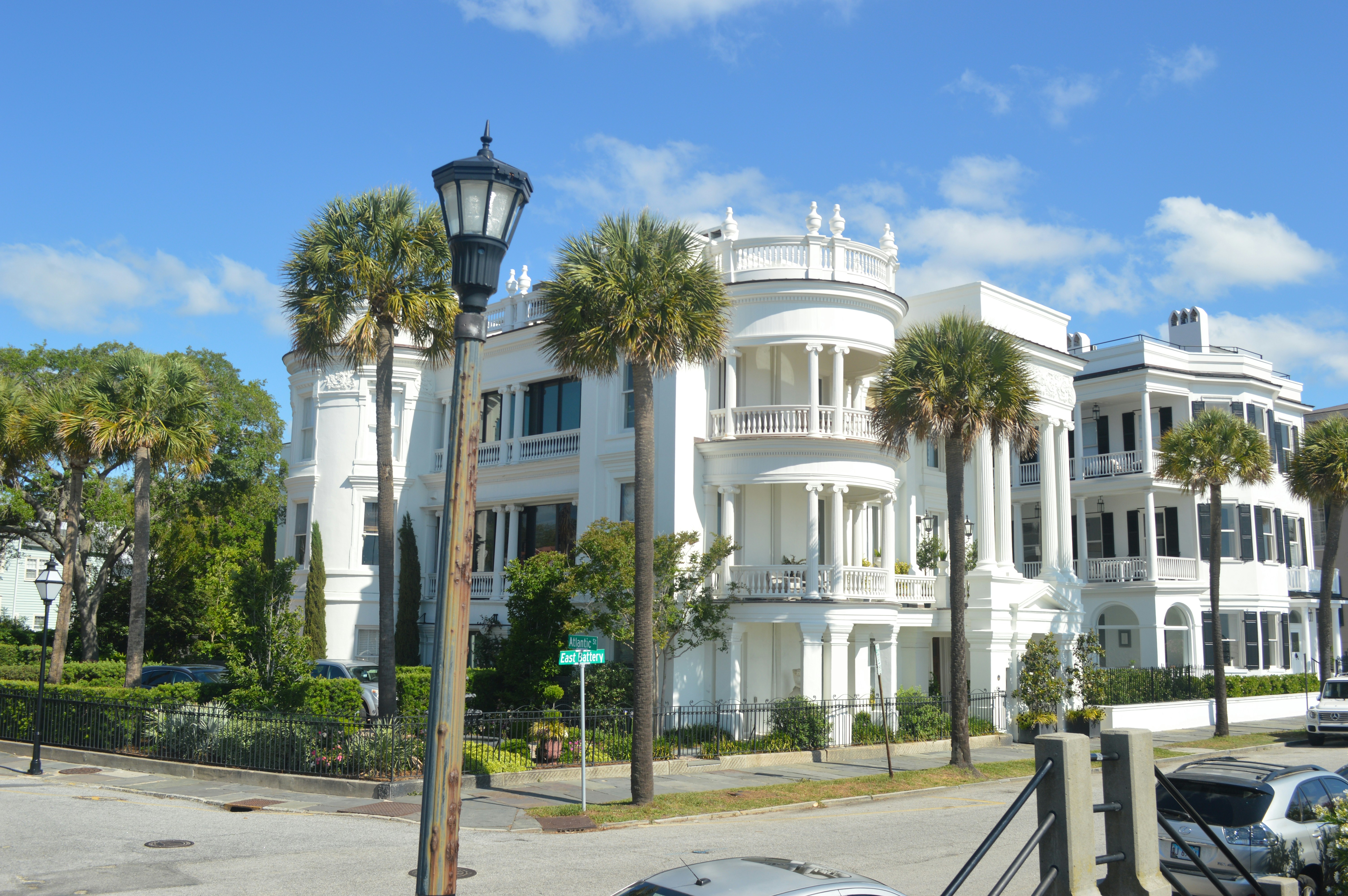 Sunlit White Terrace: Coastal Flair and Palm-adorned Grandeur
