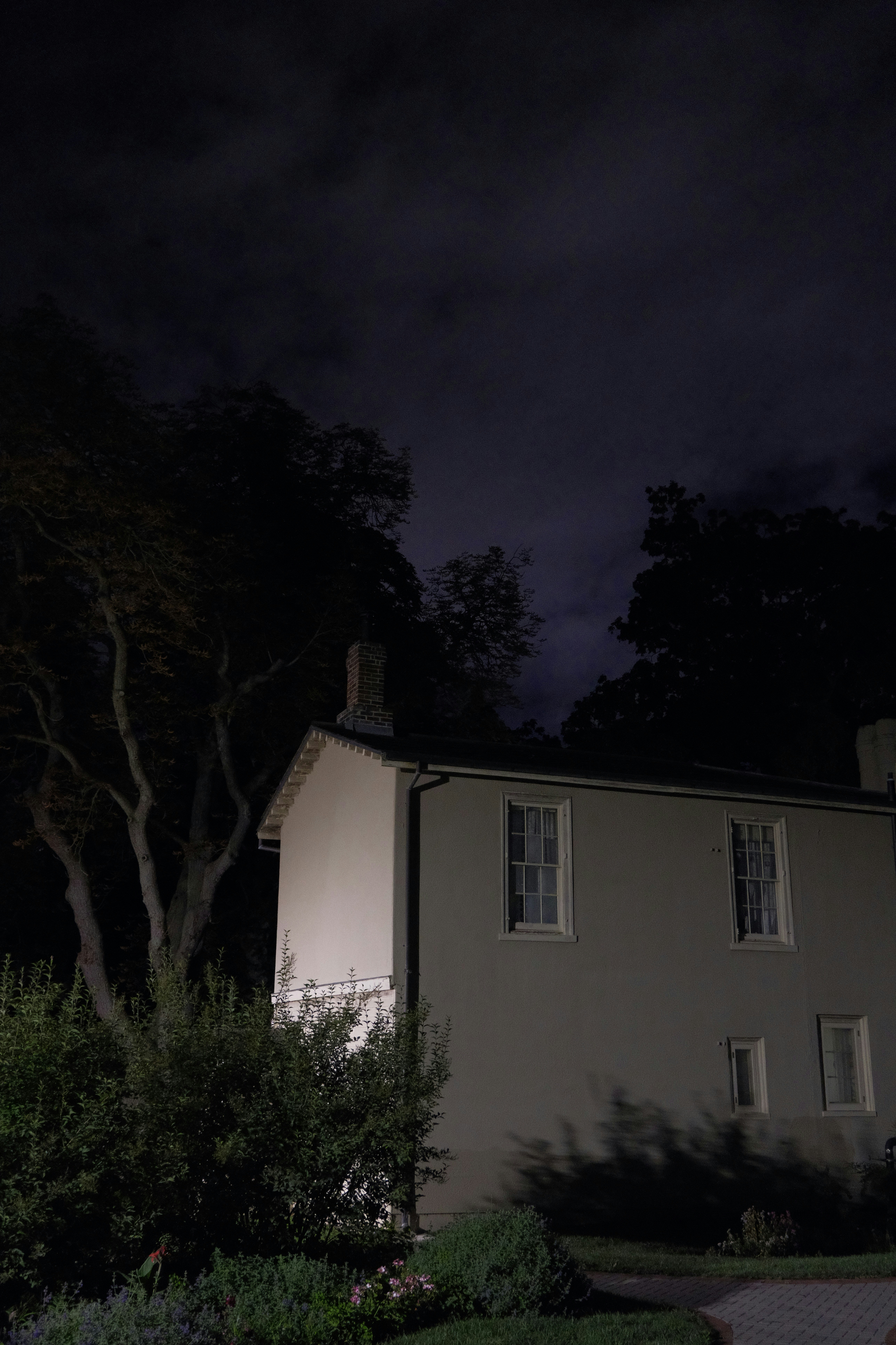 Moonlit Dormer: A Quiet Night Surfaces the House