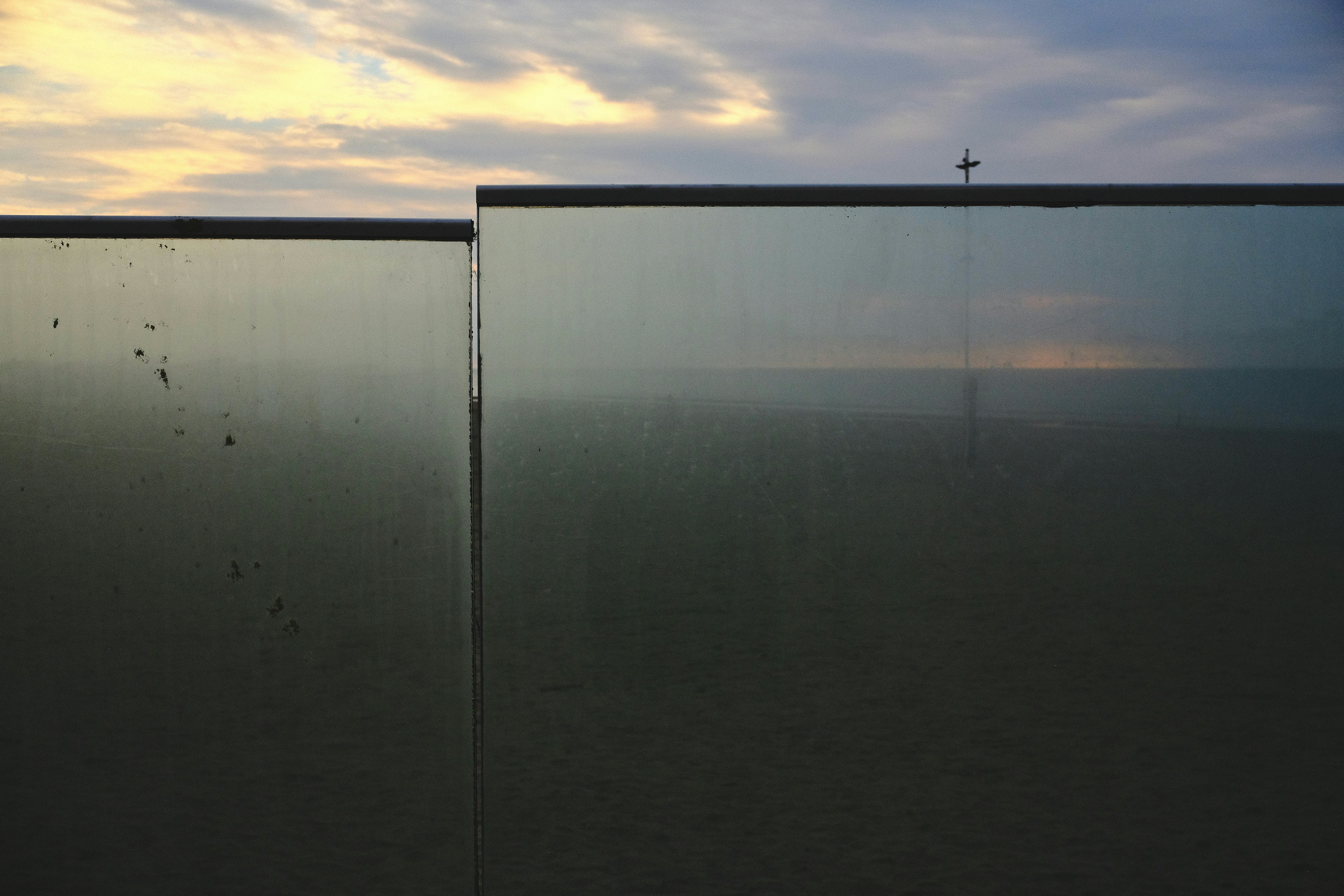 Fence Reflections at Dusk