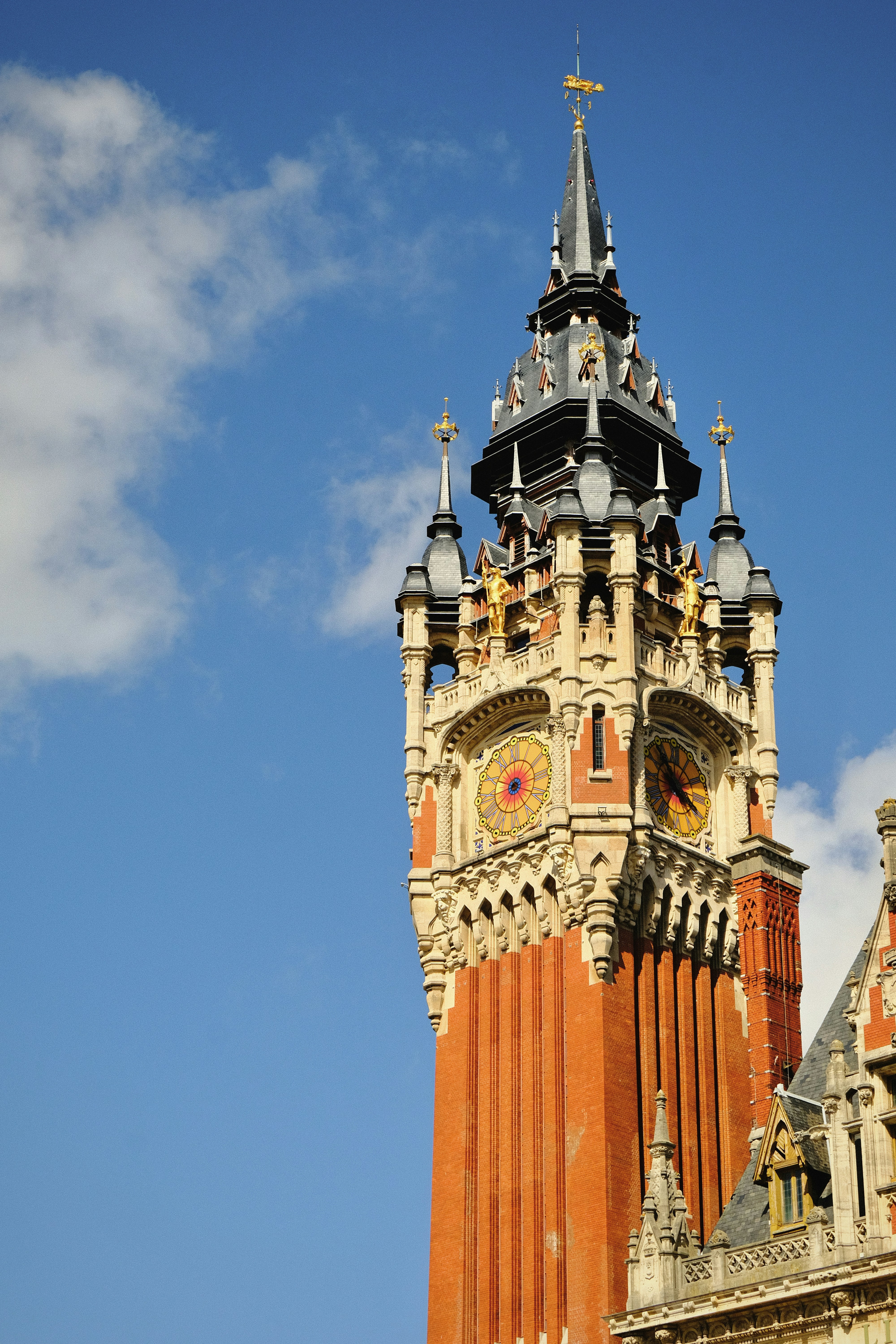 Spire of Time: A Clocktower Reaching Toward a Cerulean Sky