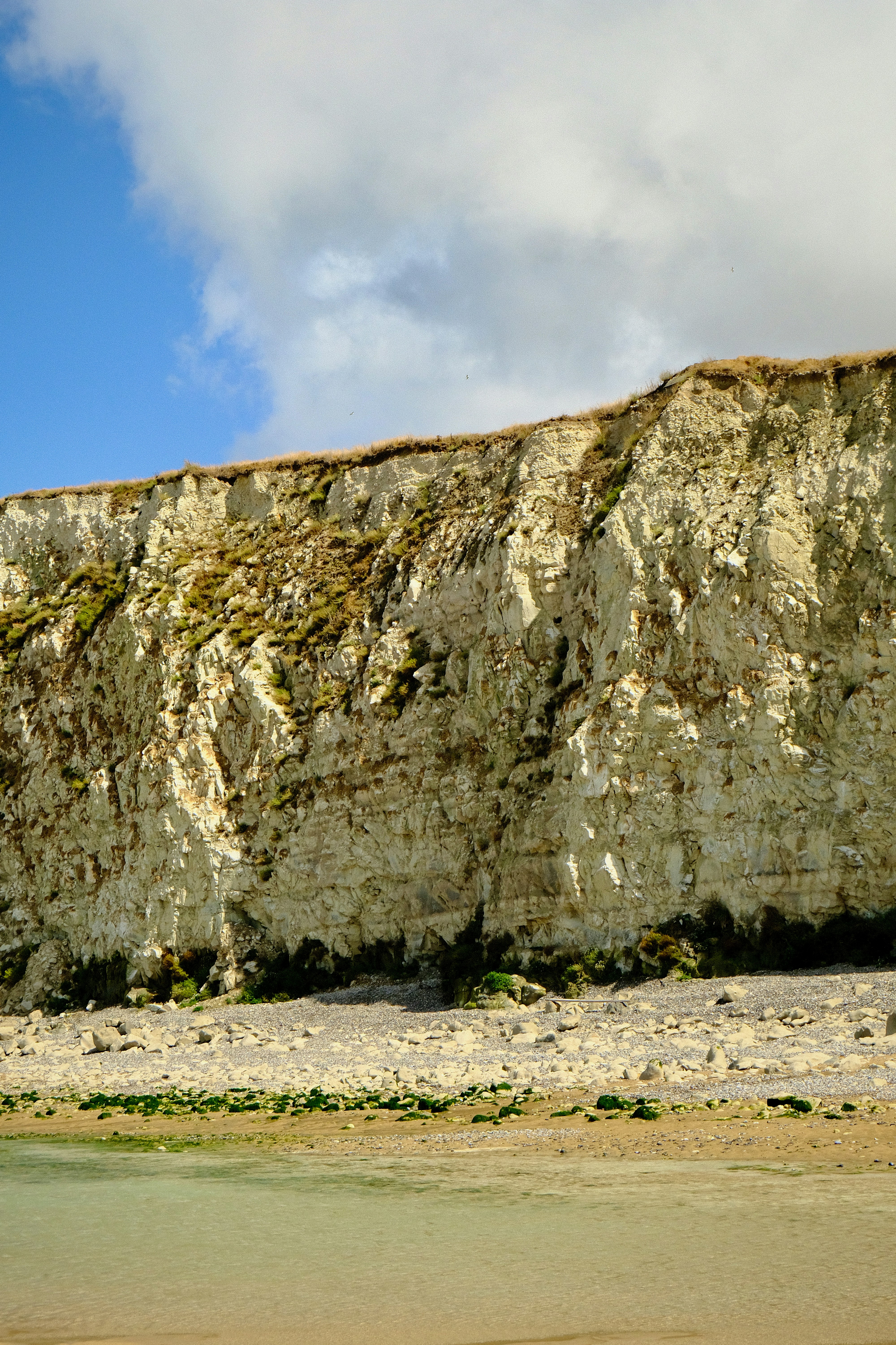 Cliff Edge over Quiet Tide