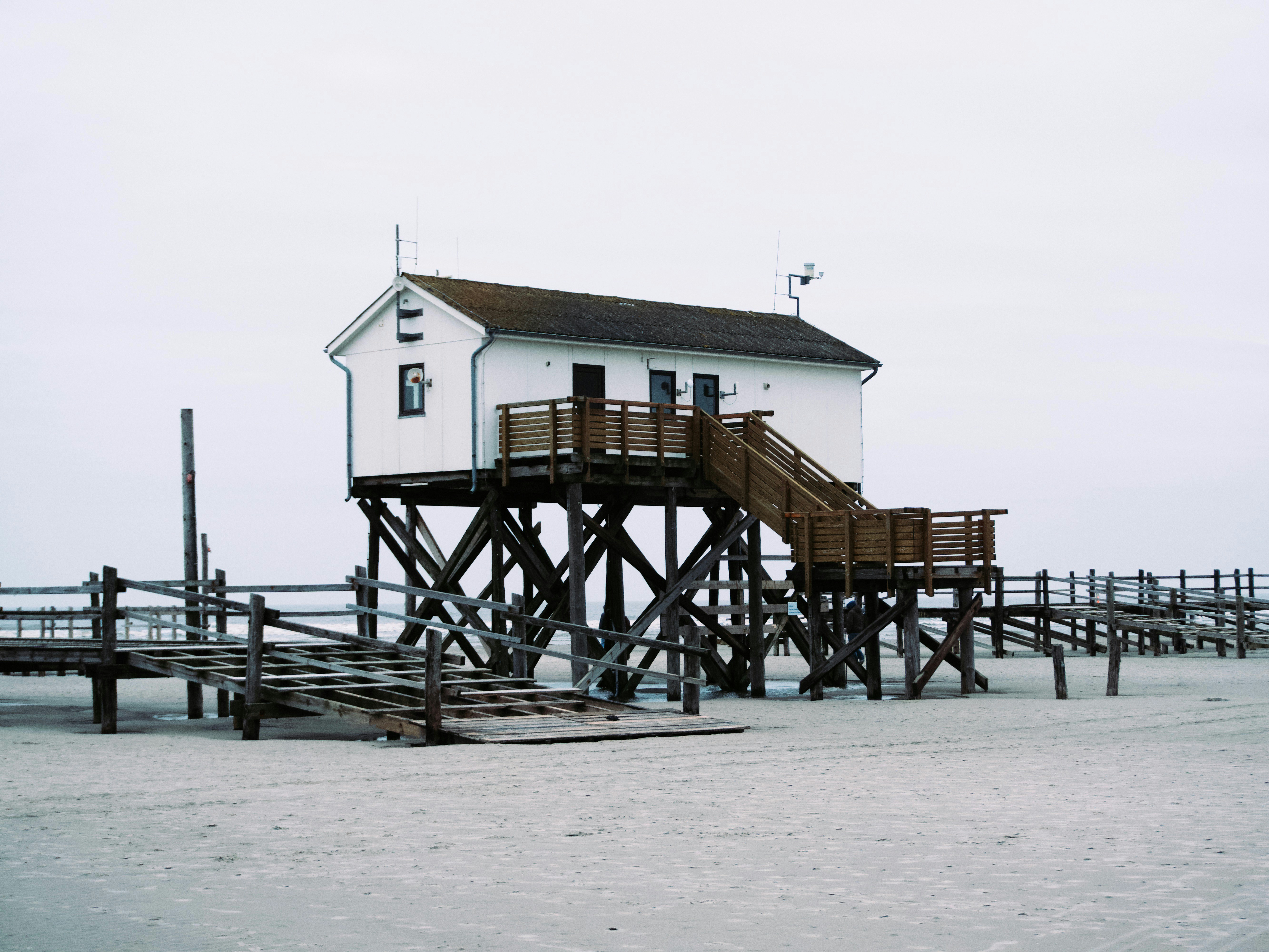 Stilted Retreat over Quiet Tides