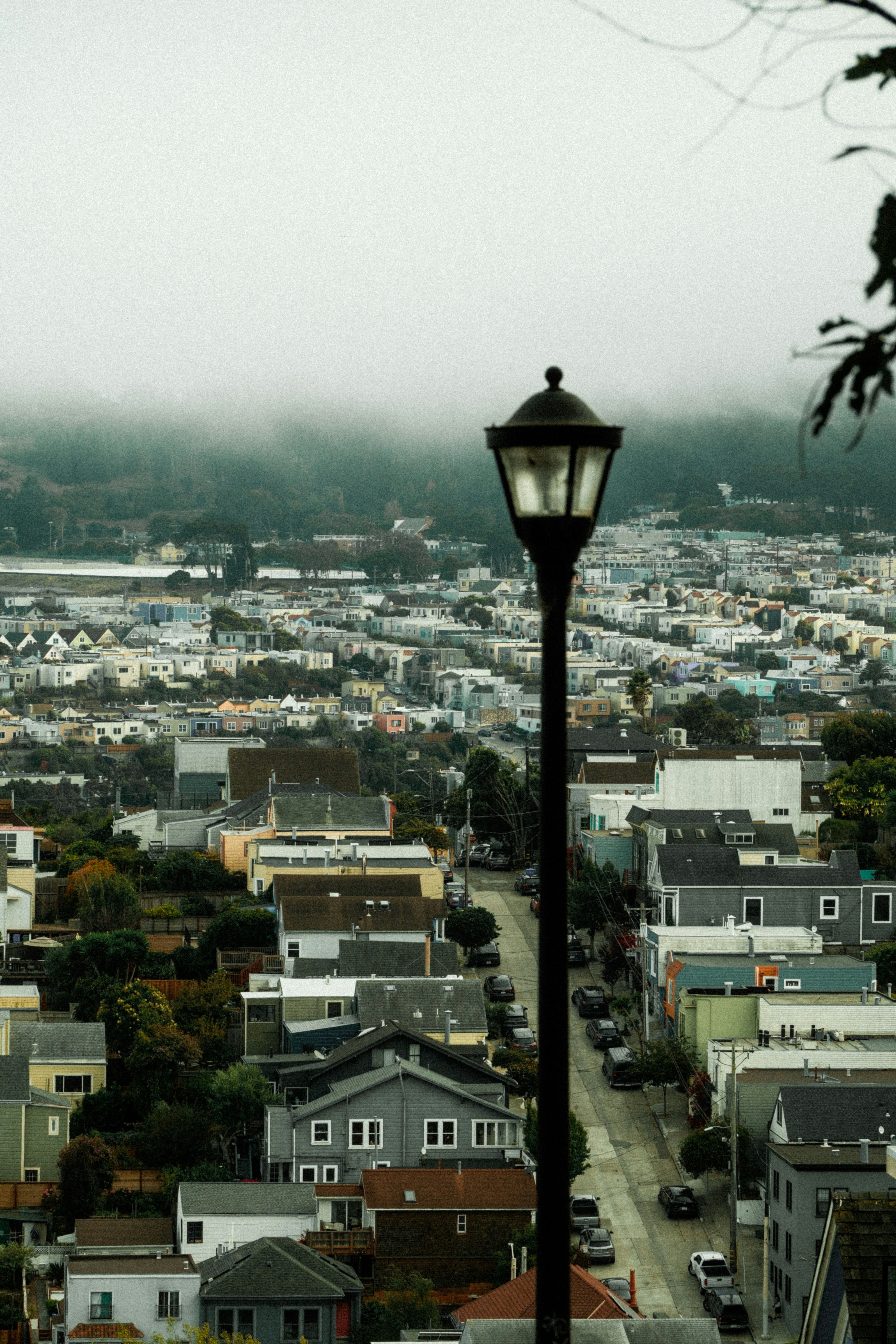 Lamp Post Overlooking a Quiet Coastal Town