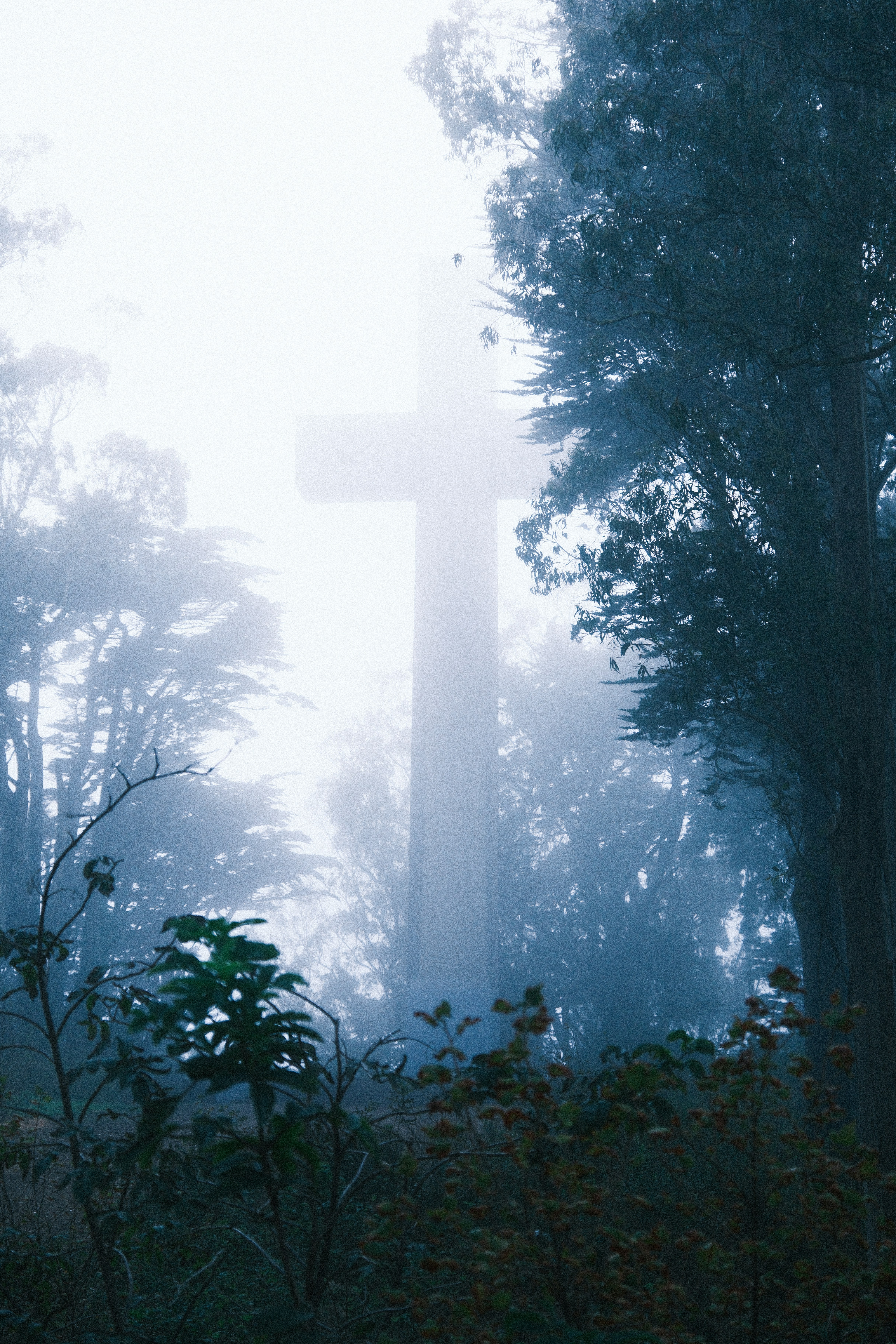 Mist-Washed Cross: A Silhouette in the Fog