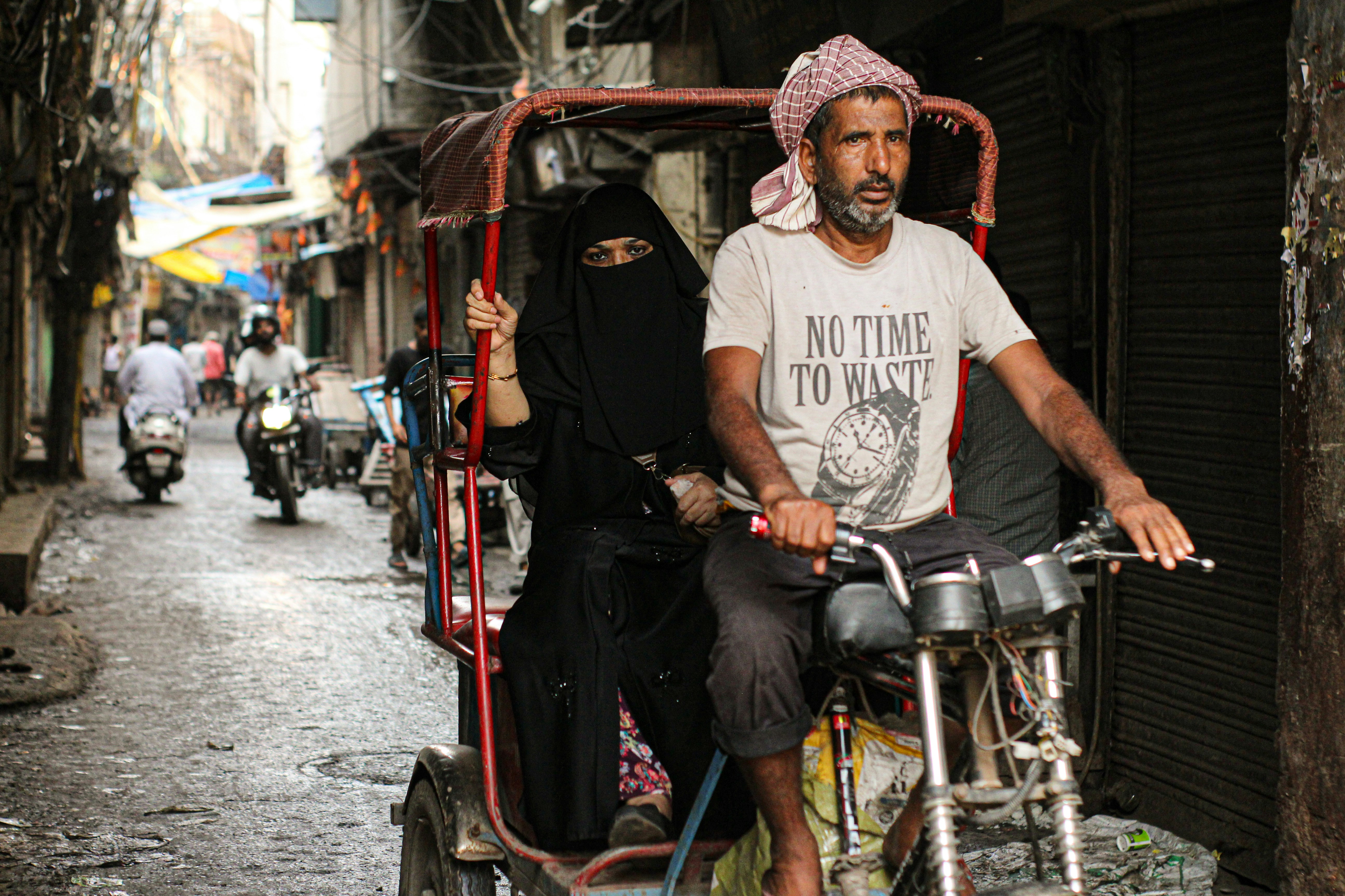 Rickshaw Ride Through a Narrow Street