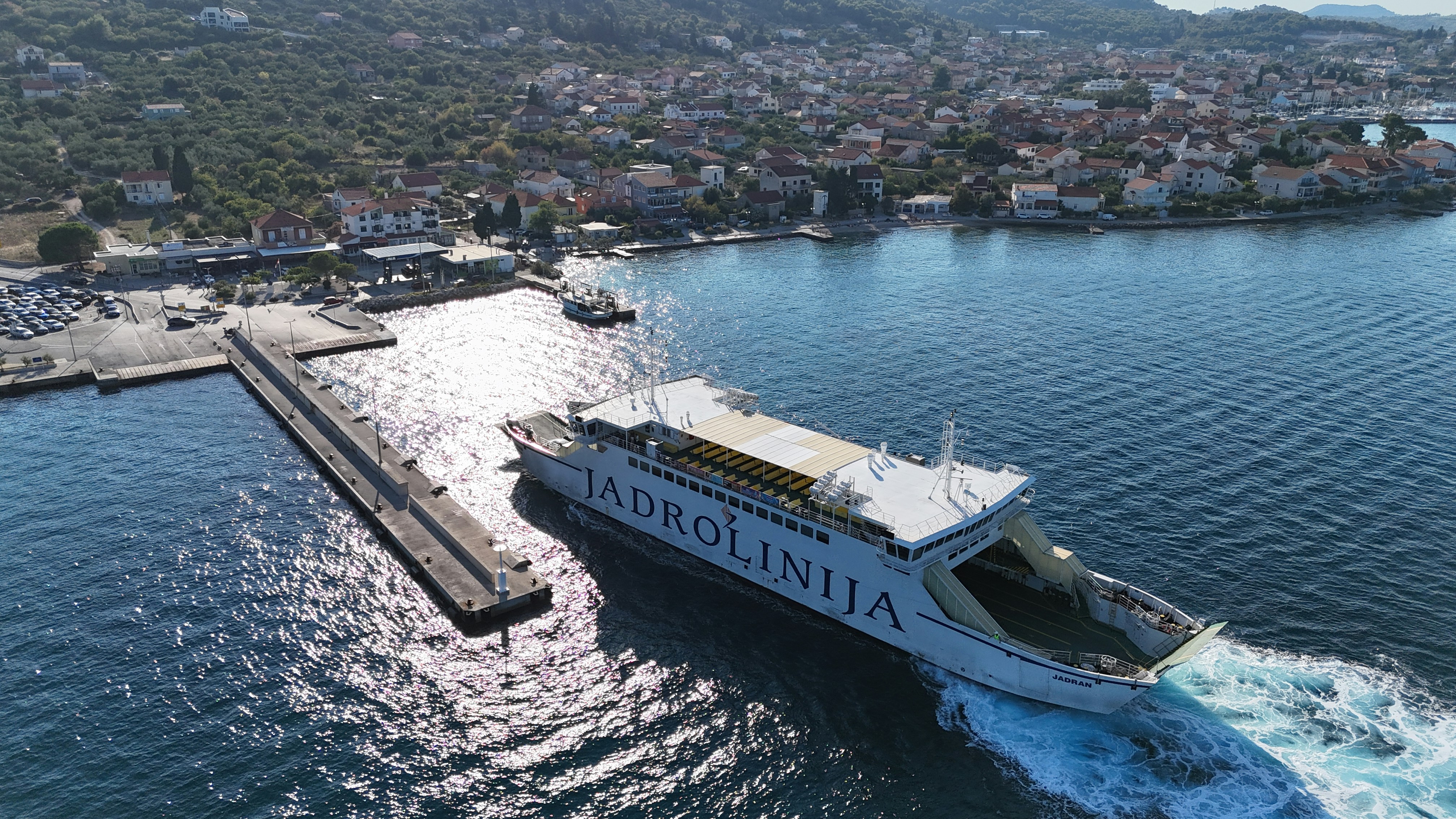 Dramatic Aegean Ferry Cut Through Sunlit Waters