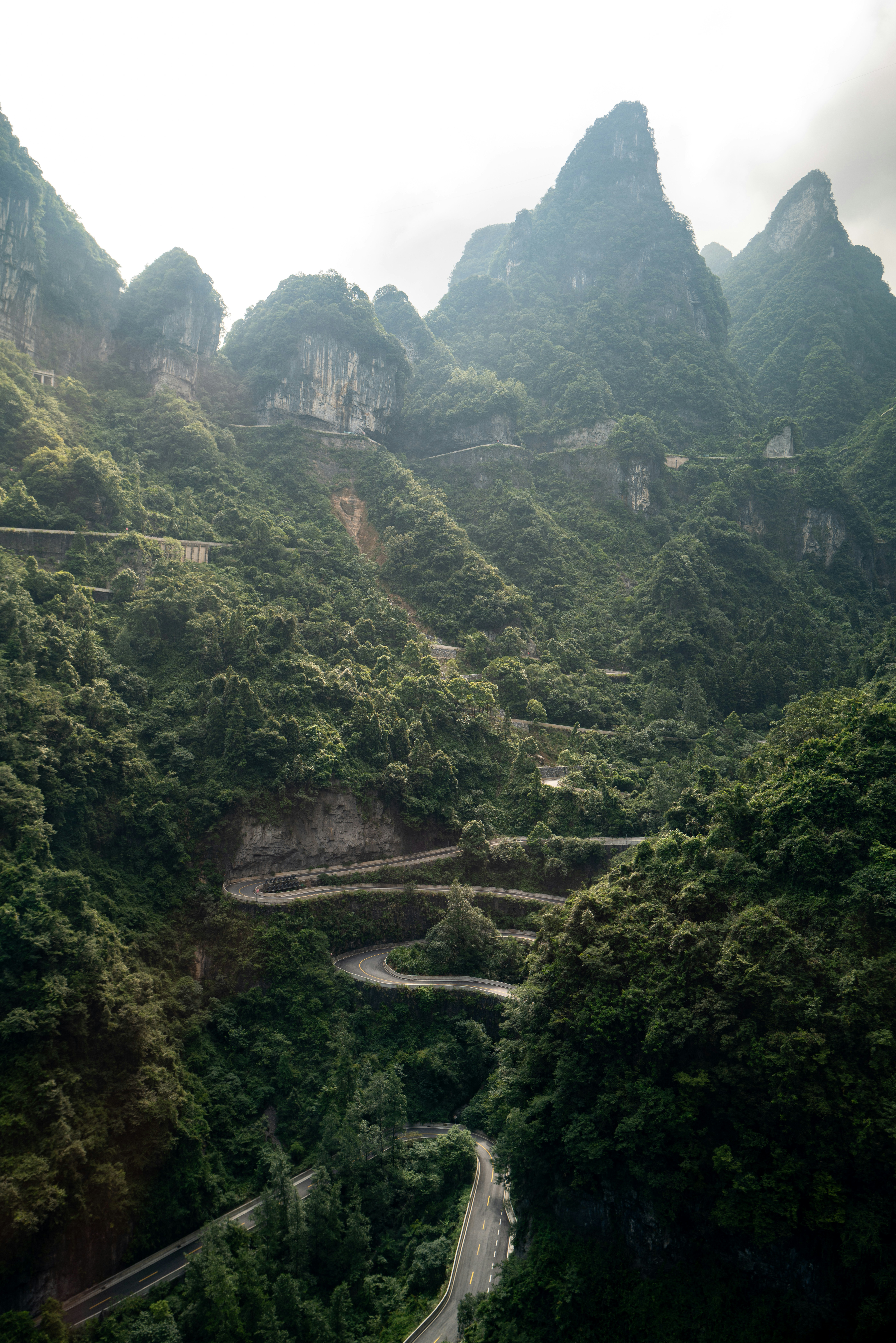 Winding Ascent through Emerald Peaks