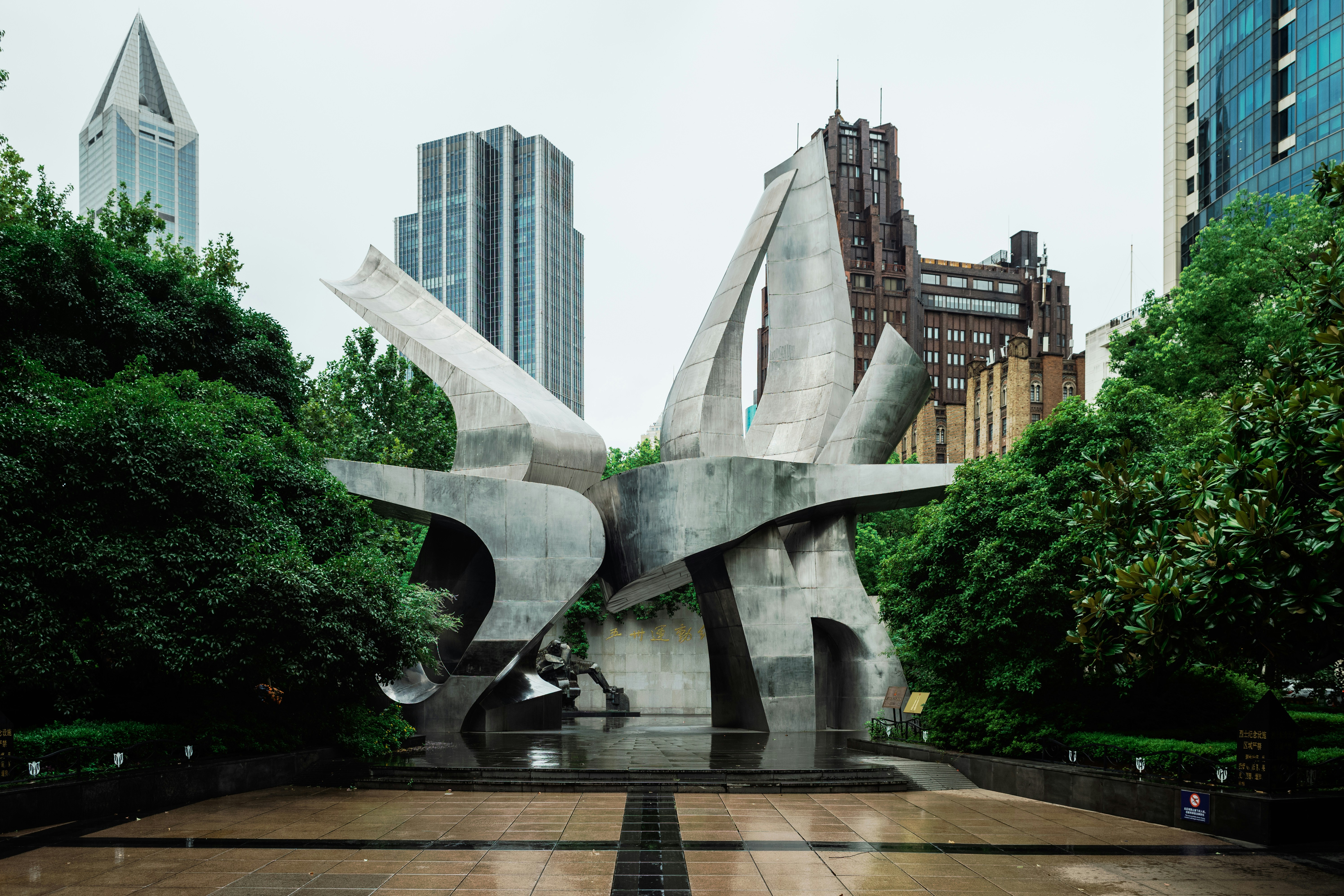 Urban Echoes: An Abstract Metal Sculpture Reaching Toward the Sky