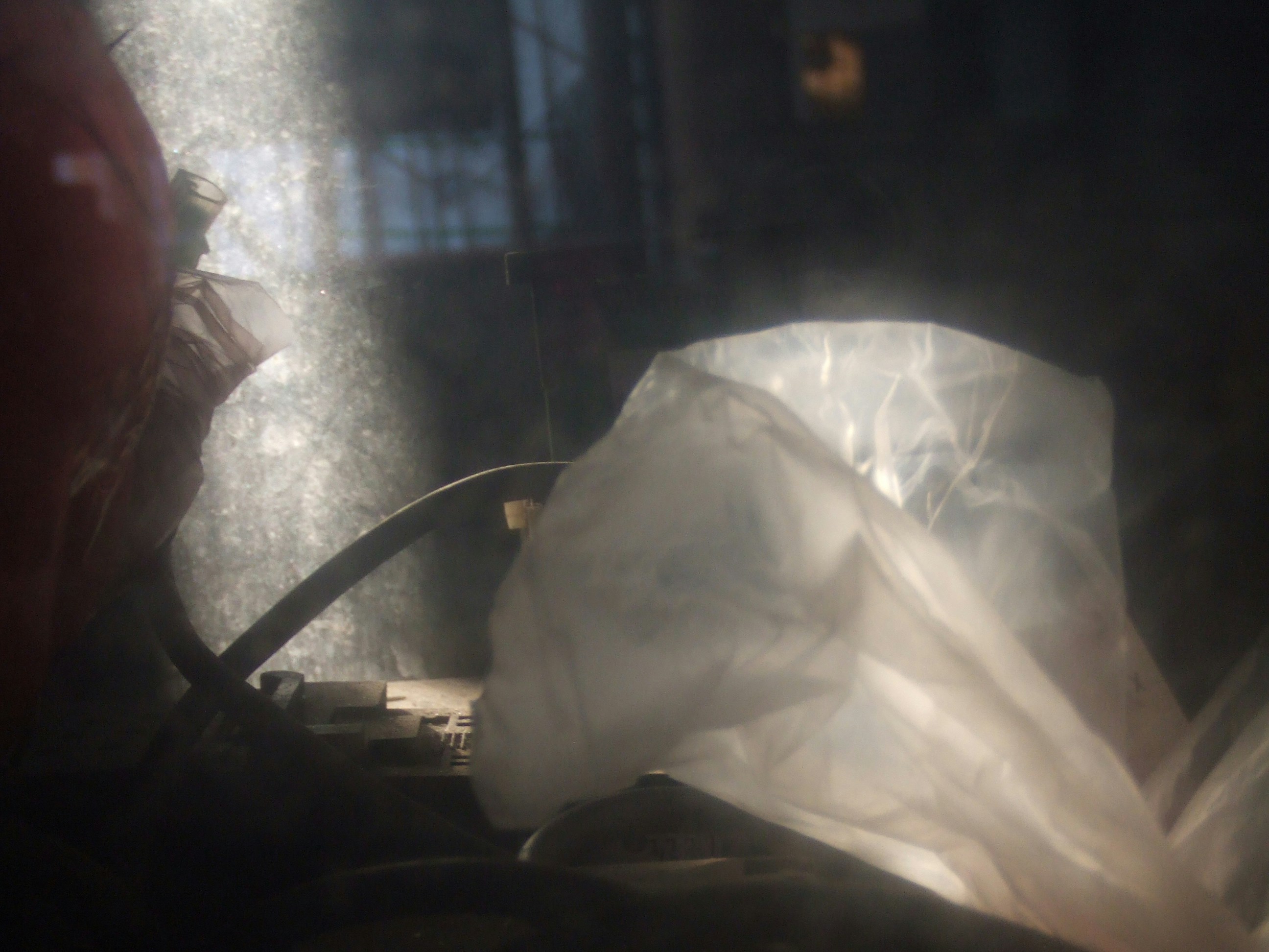 Backlit Interior Glow: A Tangle of Plastic and Shadow