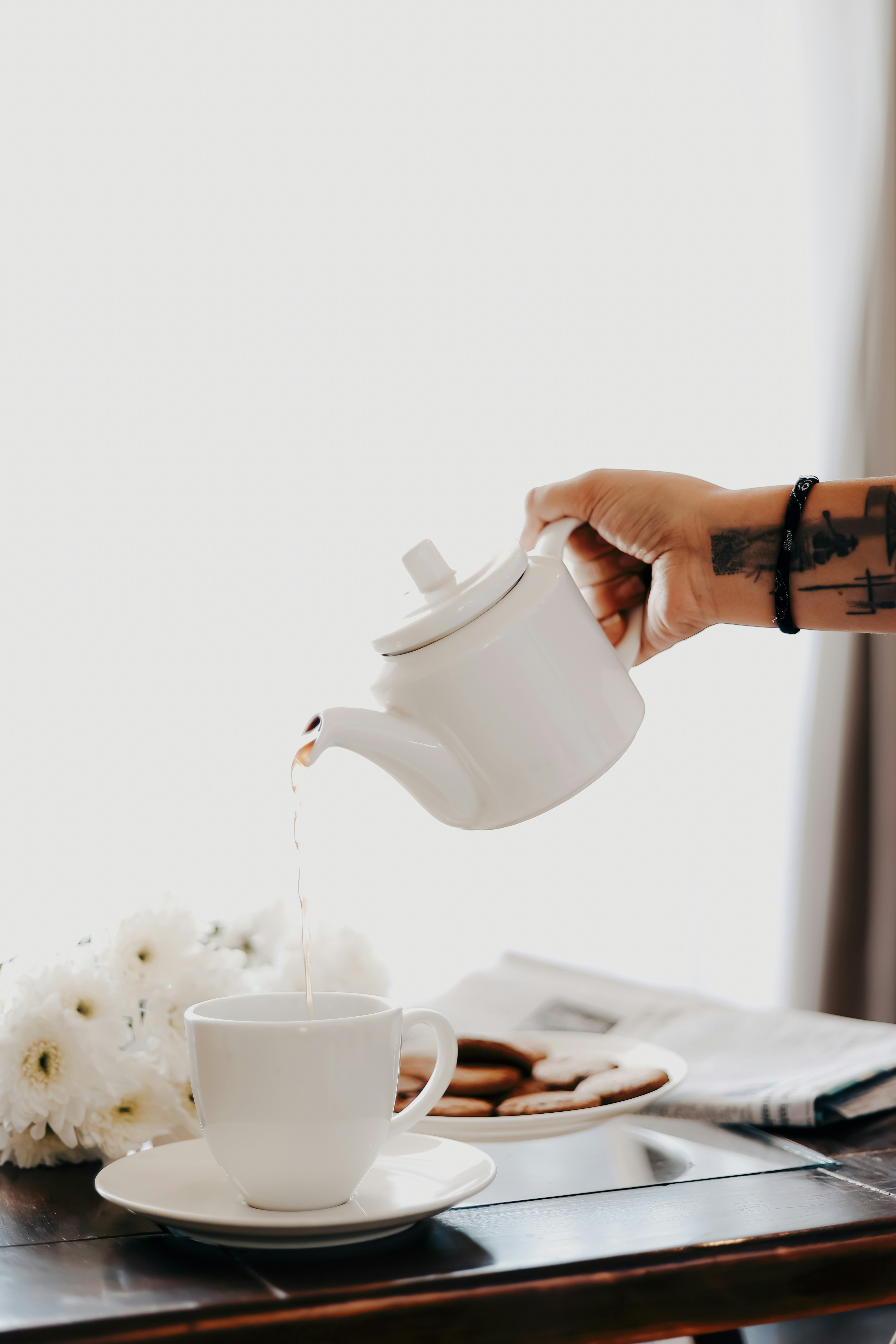 Pouring Serenity: A Handful of Tea and Tranquil Light