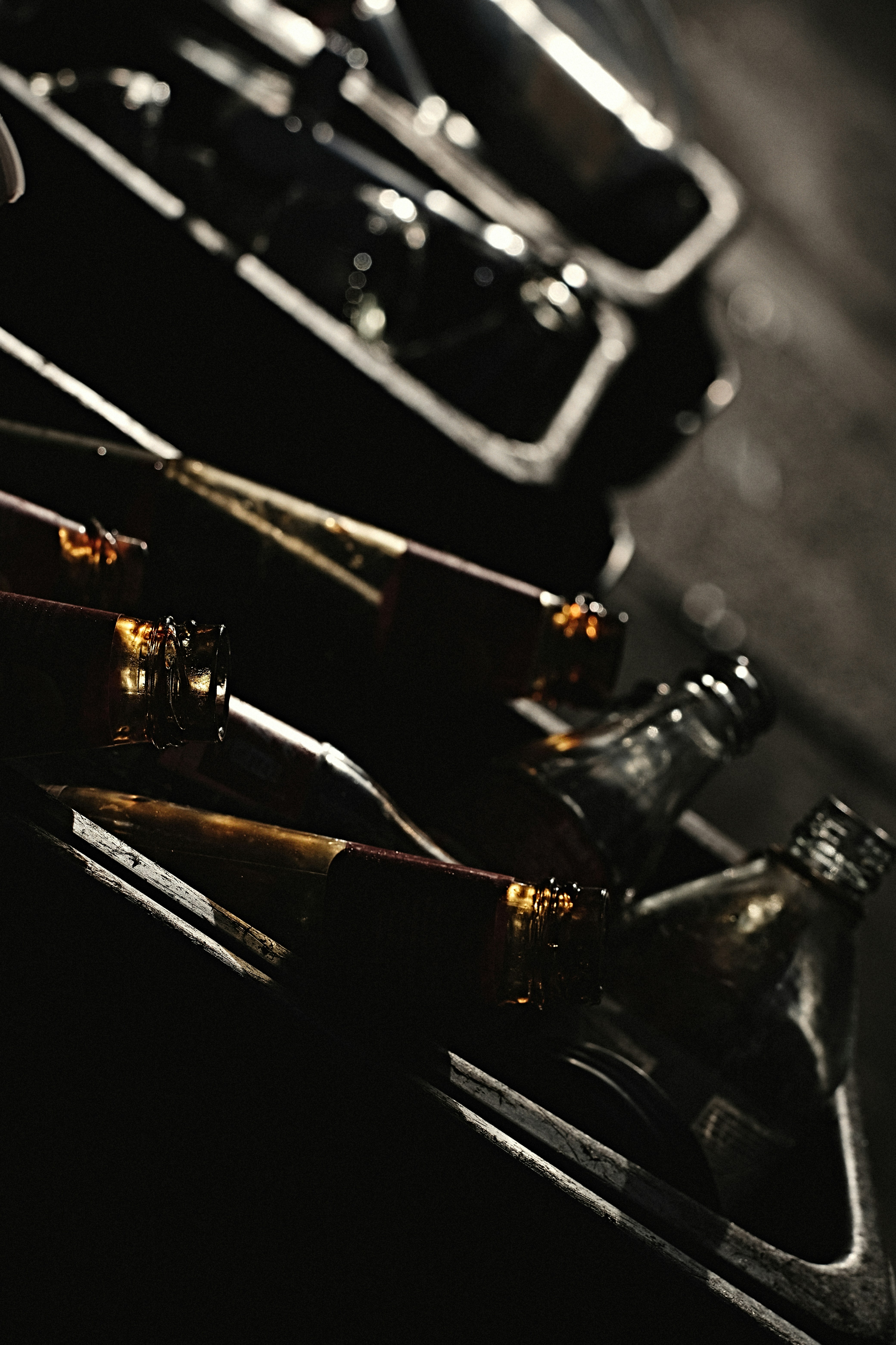 Bottles in a Dismantled Still-Life Glare