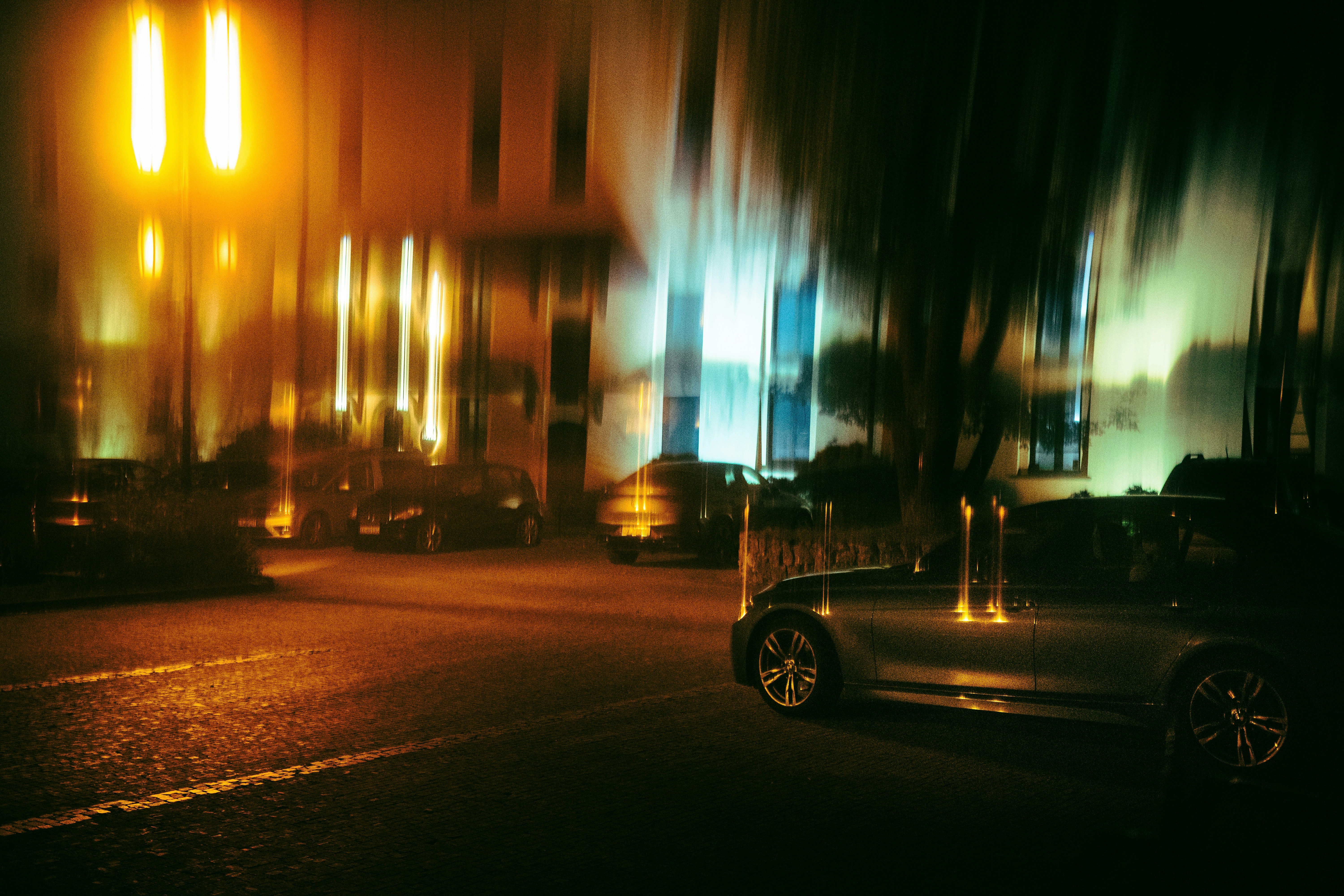 Neon Evening: A Rushed Street at Low Light