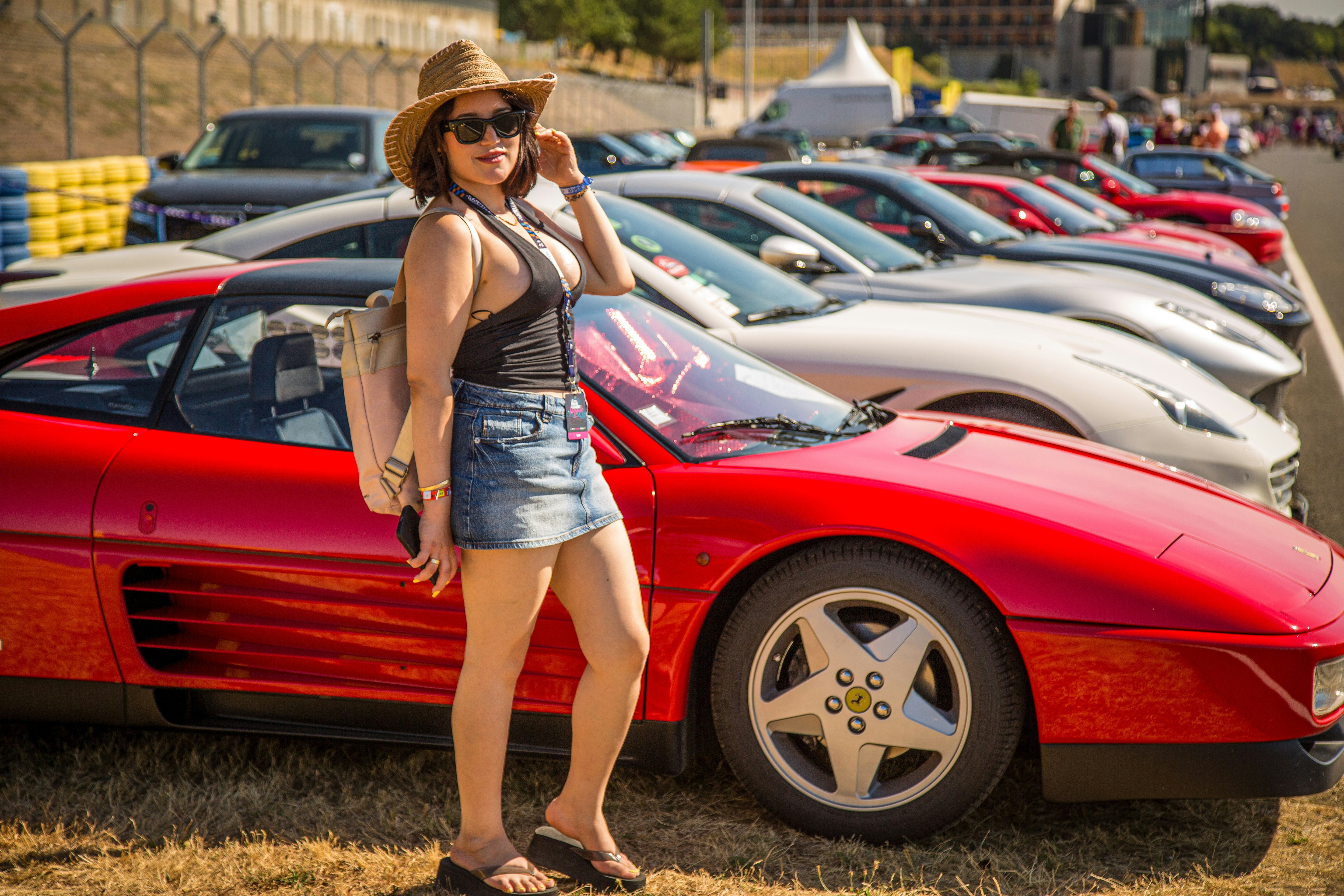 Sunlit Camaro Muse: A Cropped Moment at the Car Show