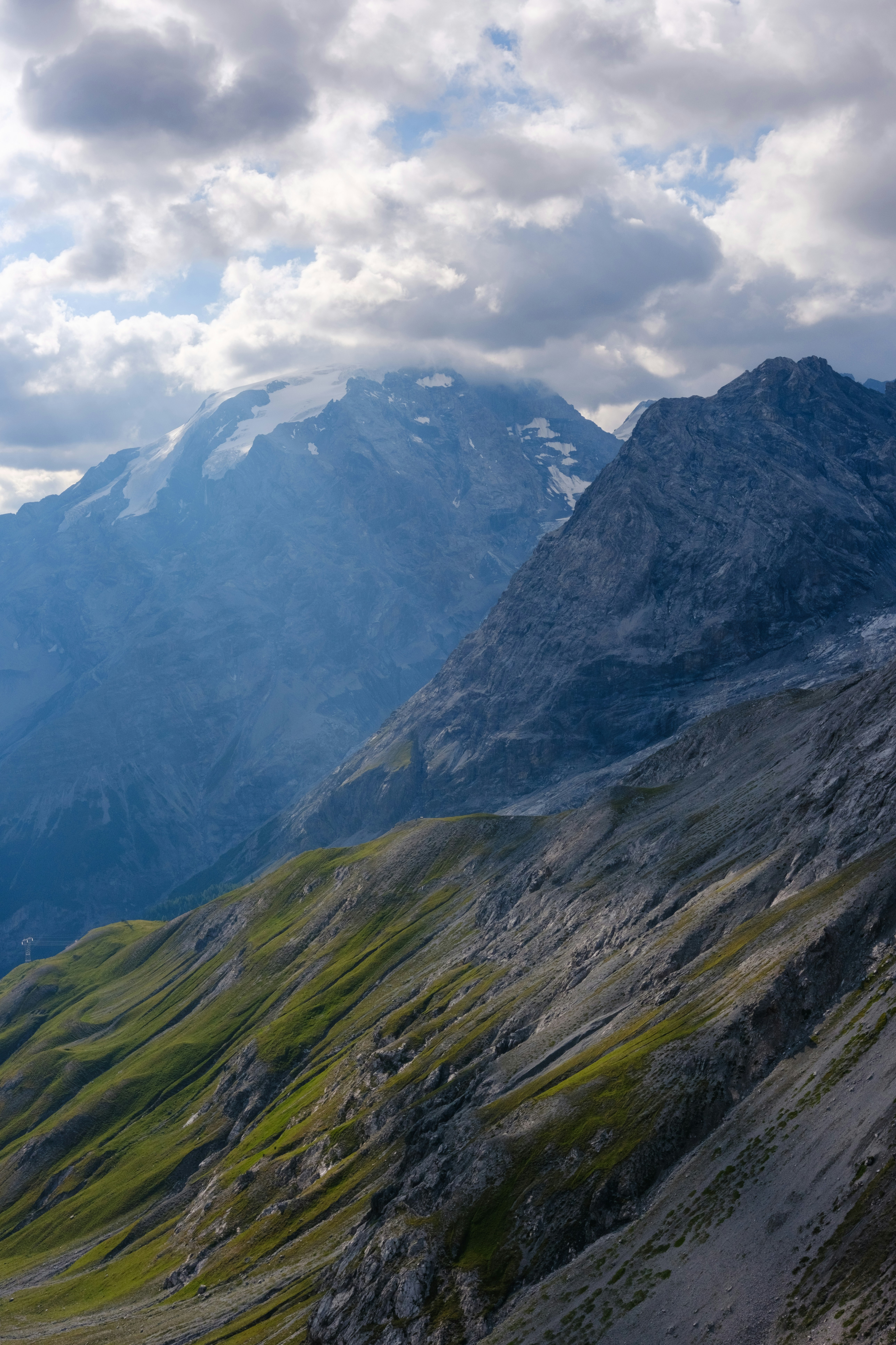 Ridge Above the Clouds: A Rugged Alpine Tapestry