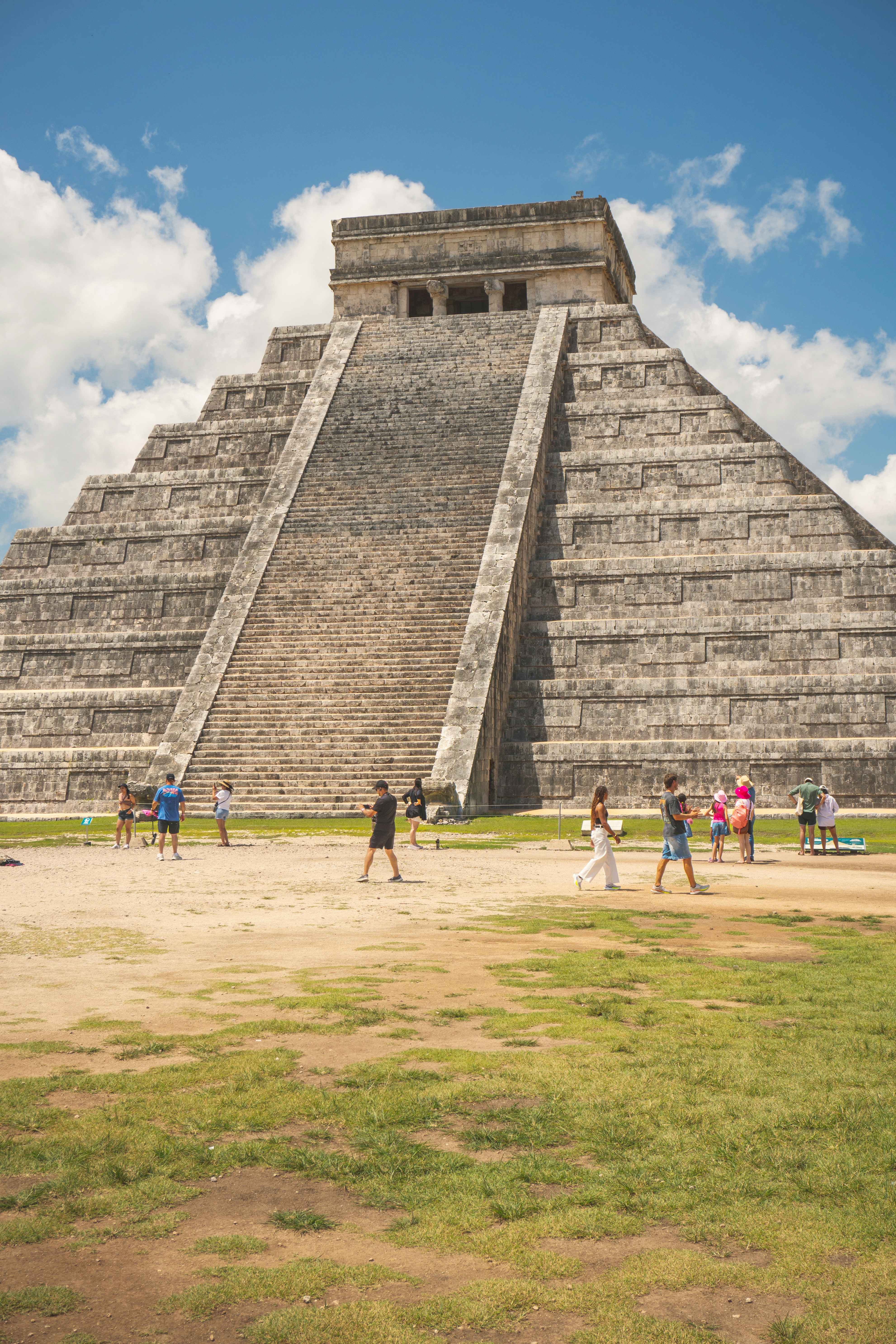  stepped ascent: a monumental Maya pyramid rising over visitors