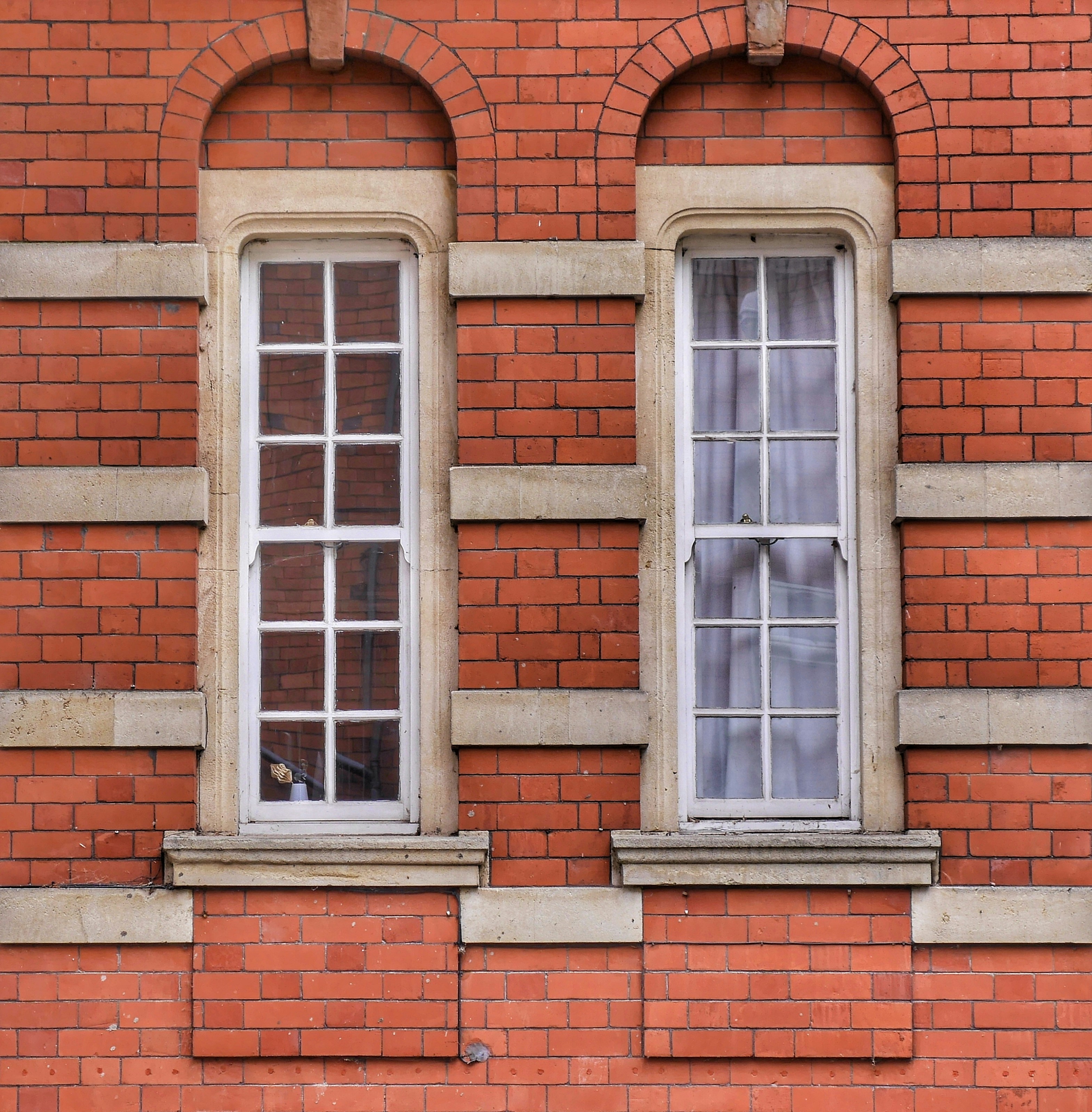 Brickwork with Twin Arched Windows: A Quiet Study in Symmetry