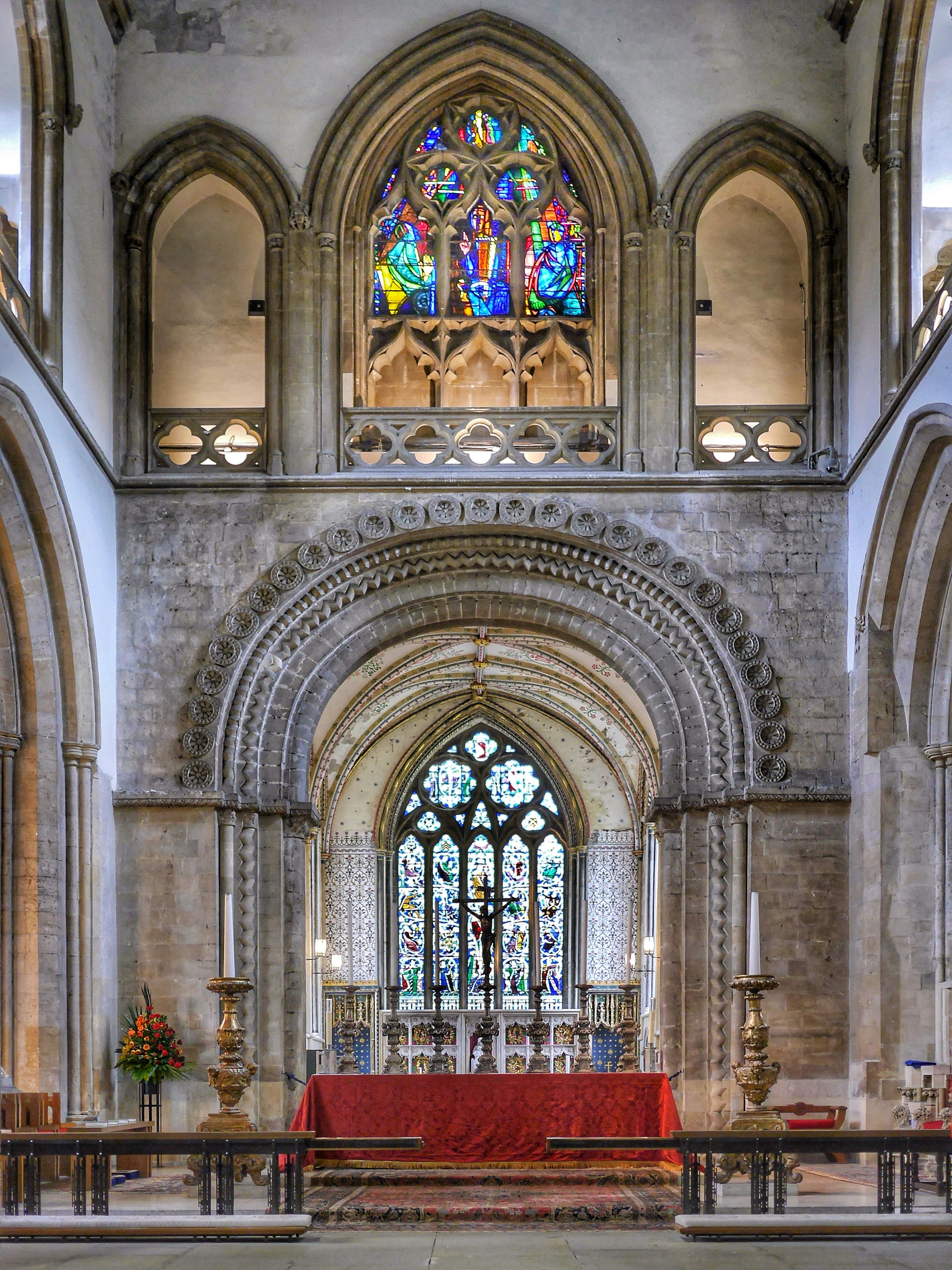 Gothic Chapel Altar Framed by Arches and Stained Glass