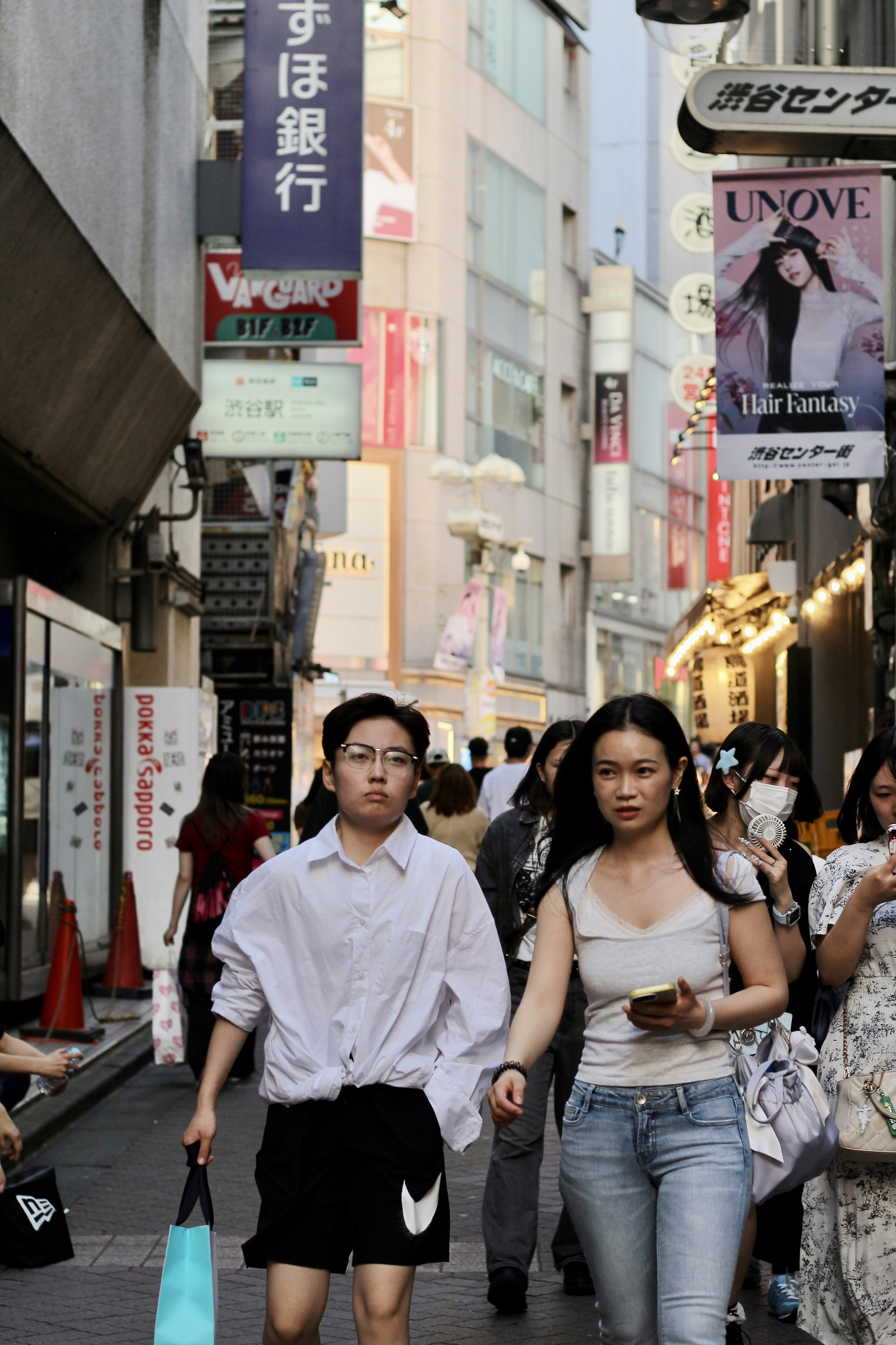 City Pulse: Faces in a Neon Alley
