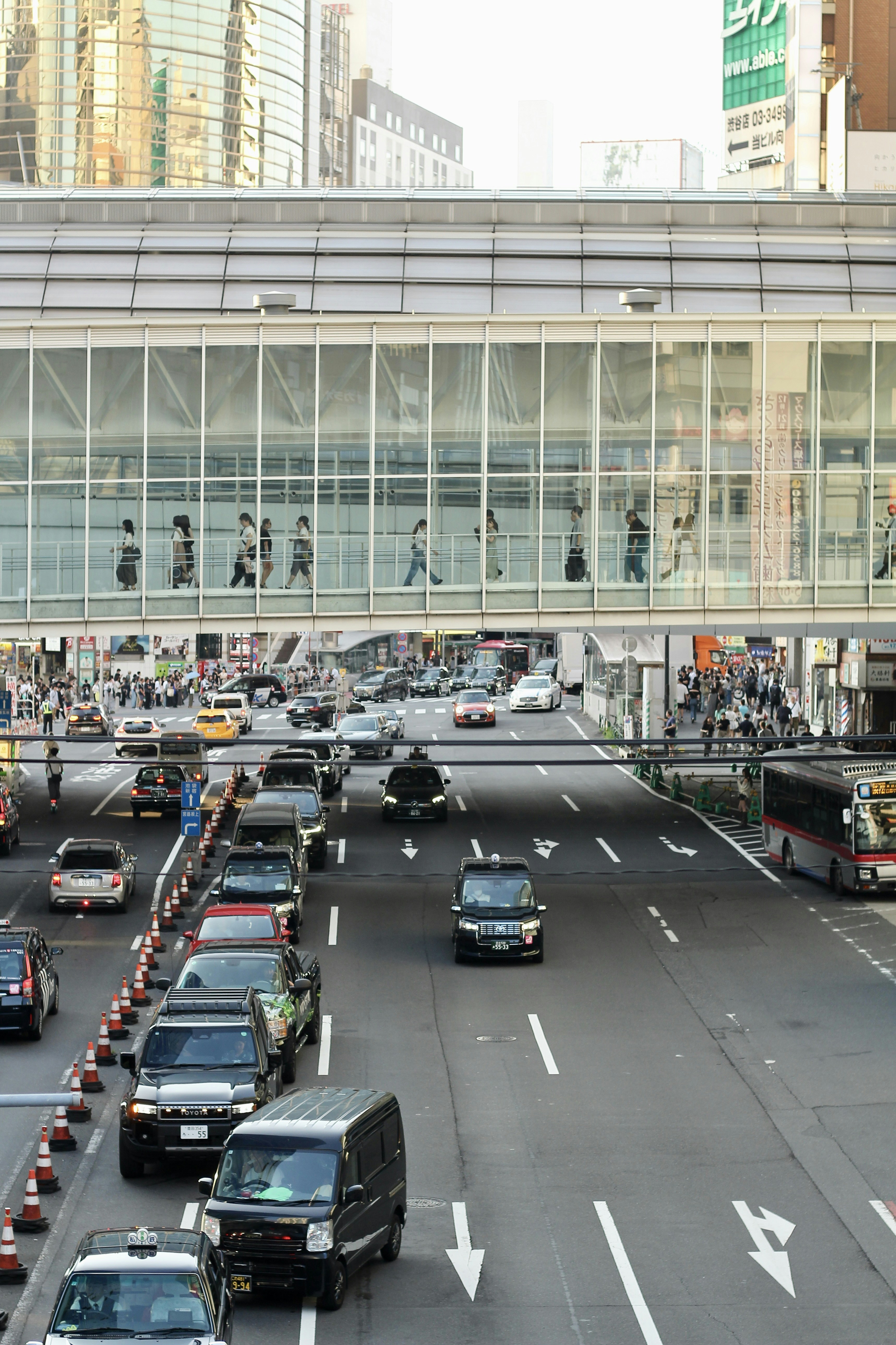 Streetway to the Skyway: Commuters and Glass Corridor over Downtown