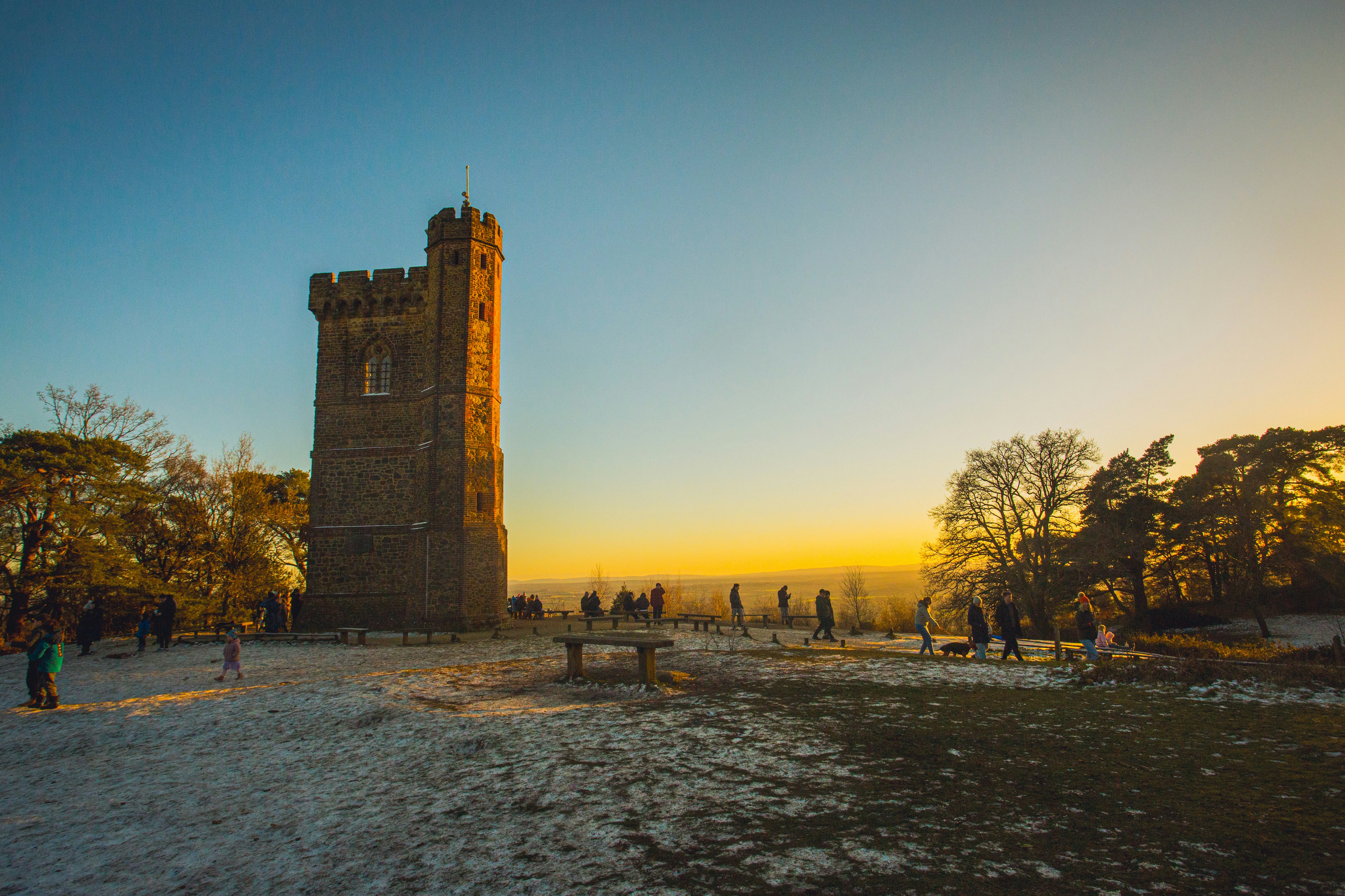 Sunlit Keep: A Towered Beacon at Dusk