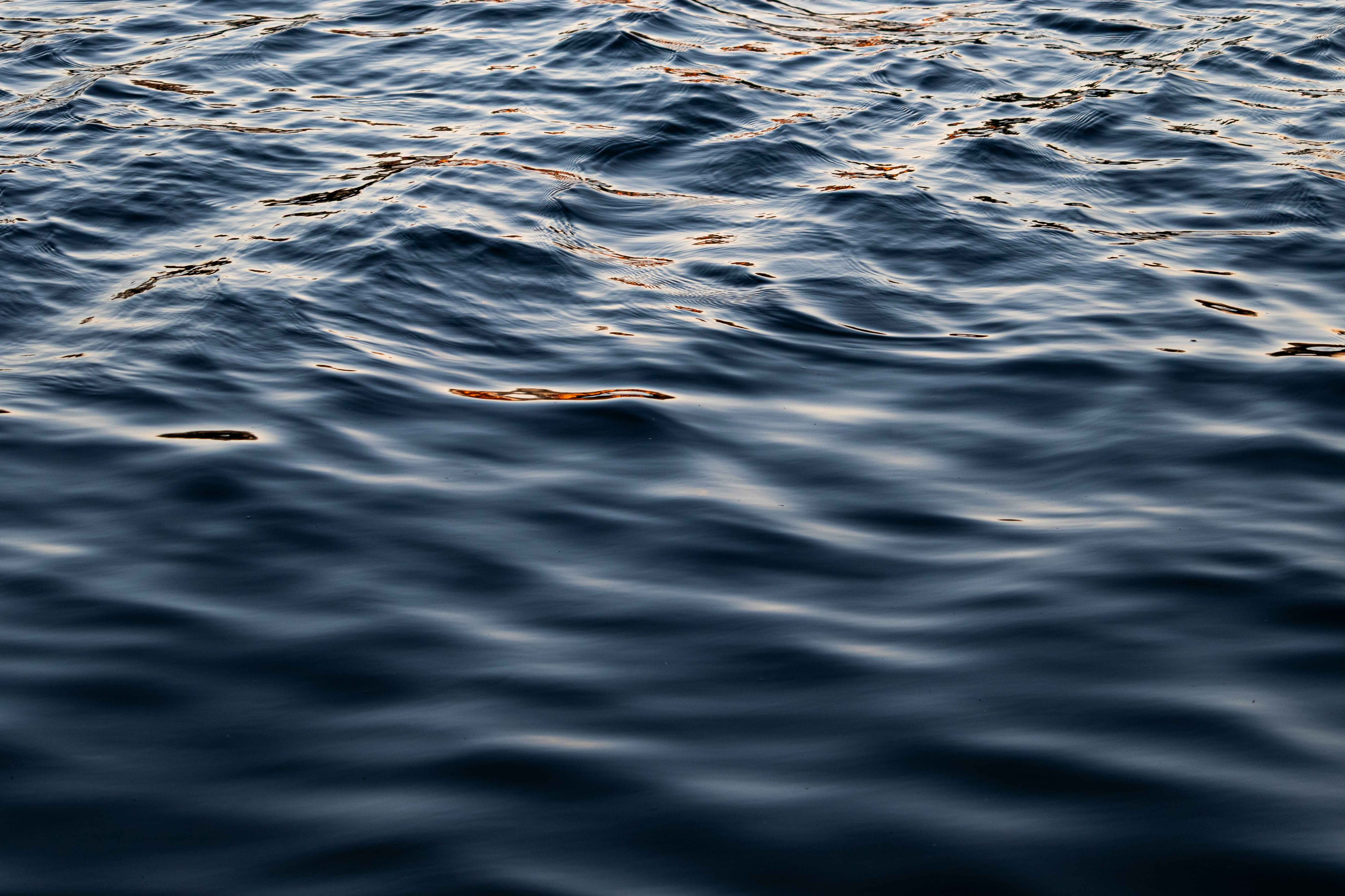 Hidden Horizon: Subtle Ripples in Evening Sea