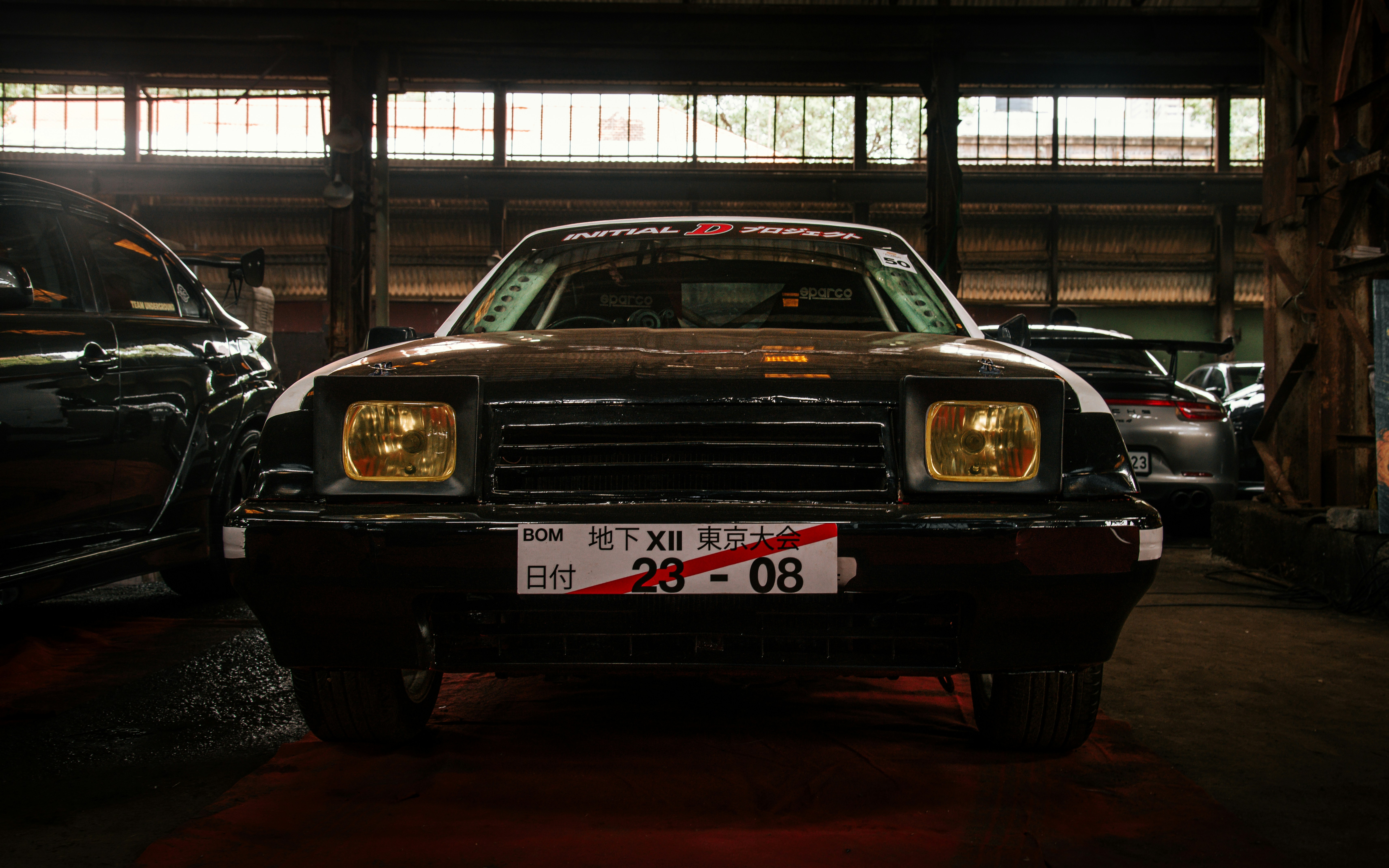 Midnight Stand: A Buried-Under-Softlight Car Emerges in the Warehouse