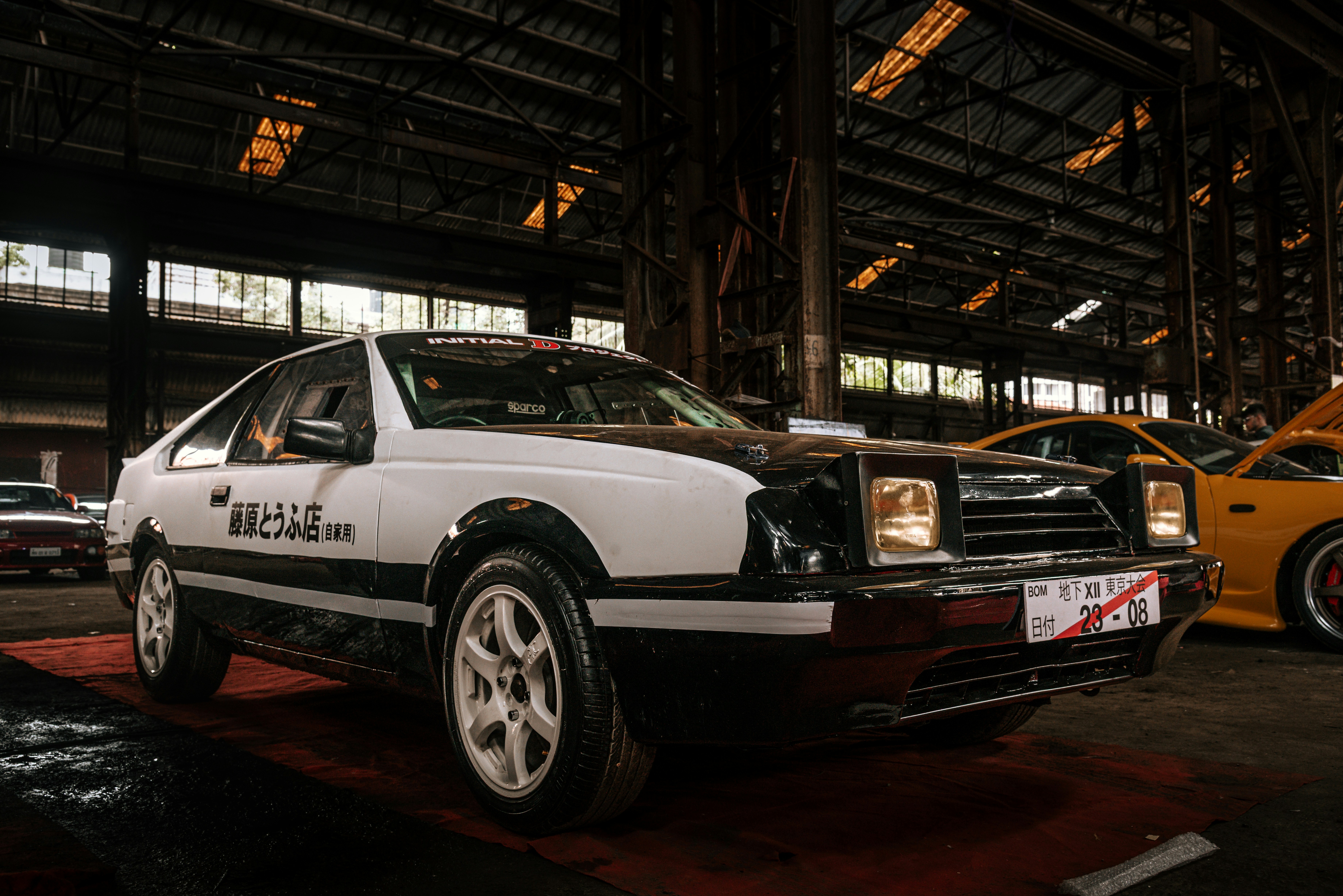 Midnight Drift: A White Retro Toyota Dares the Warehouse