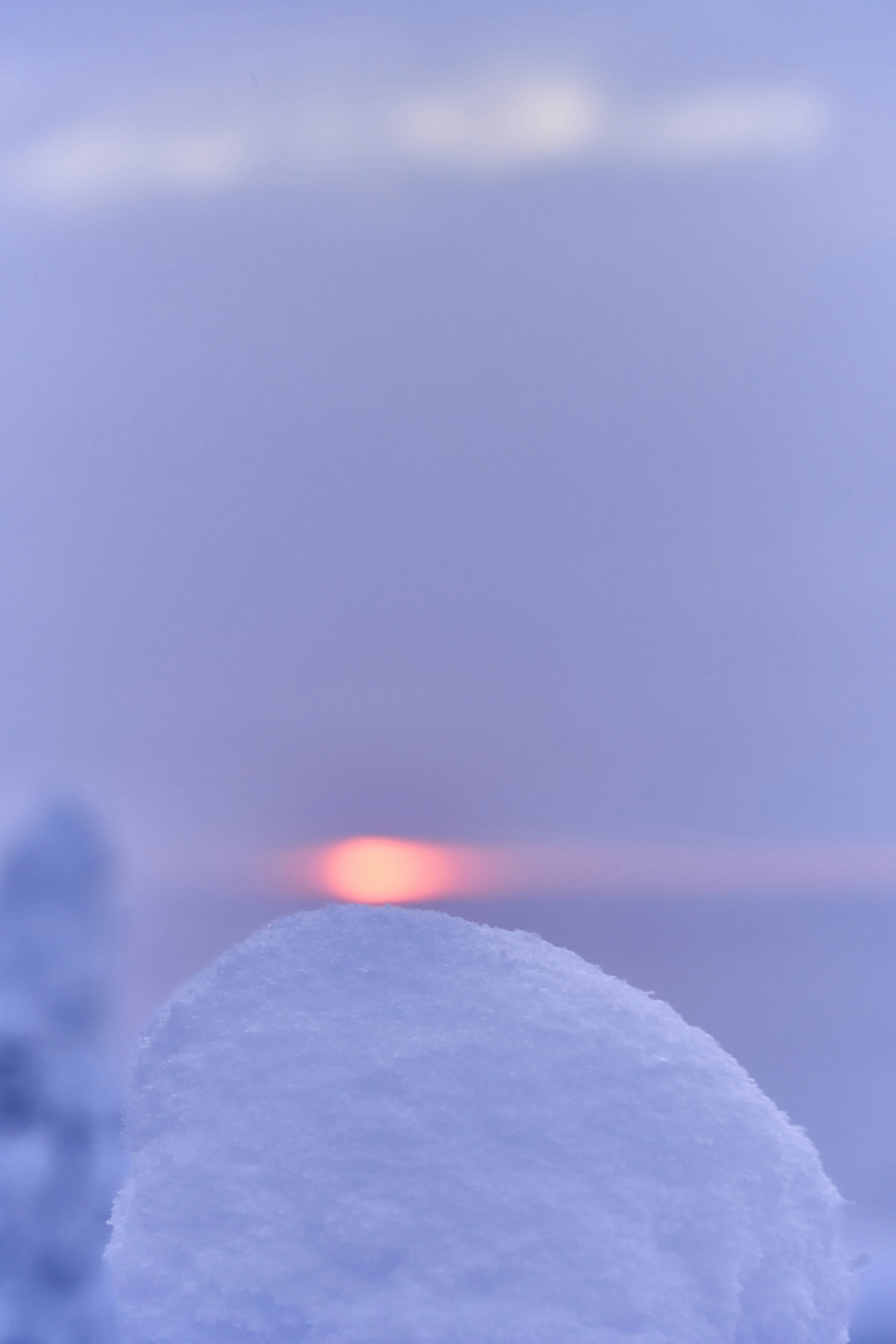 Blush Sunset Over a Frosted Horizon