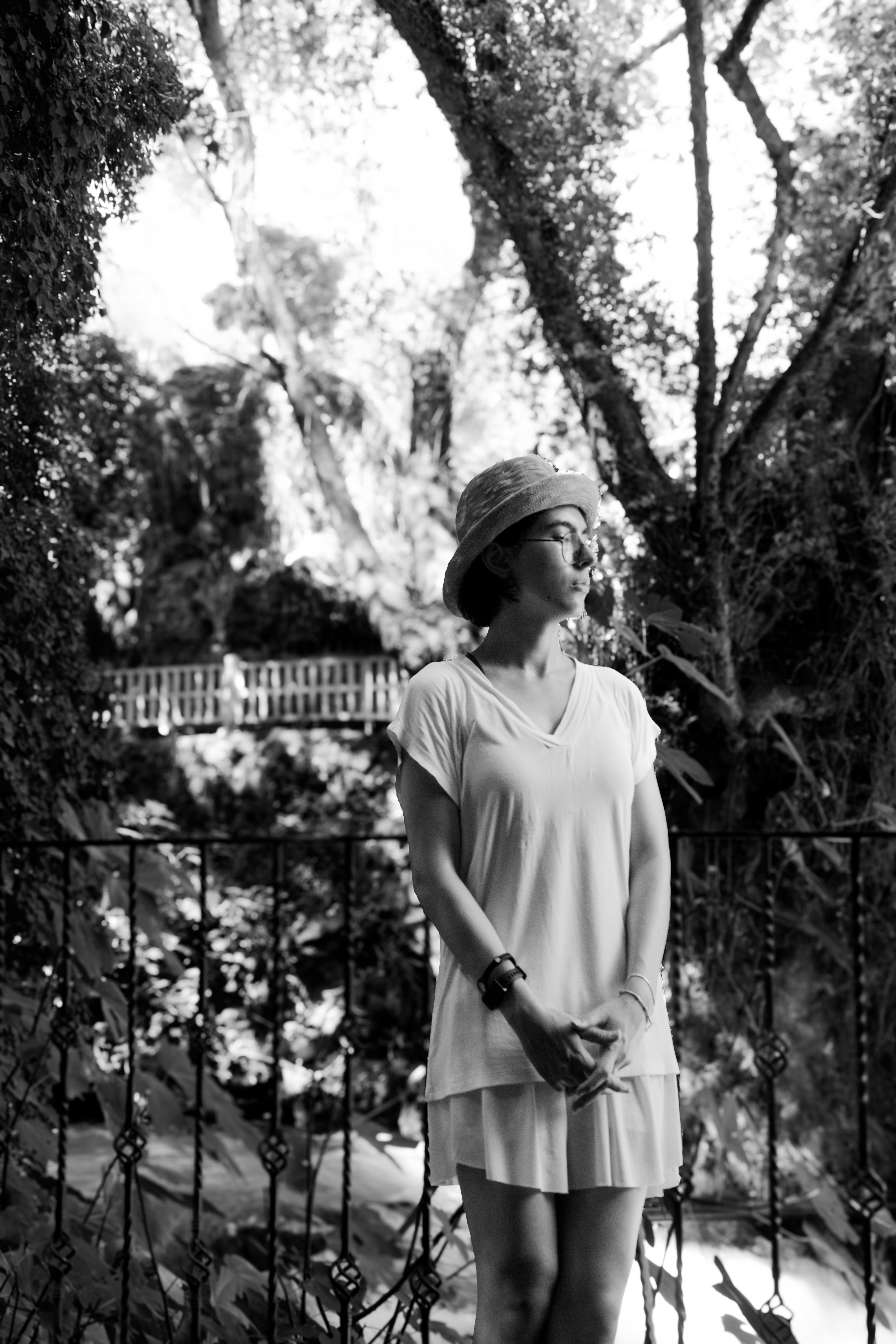 Portrait in Dappled Light: A Quiet Moment on the Balcony