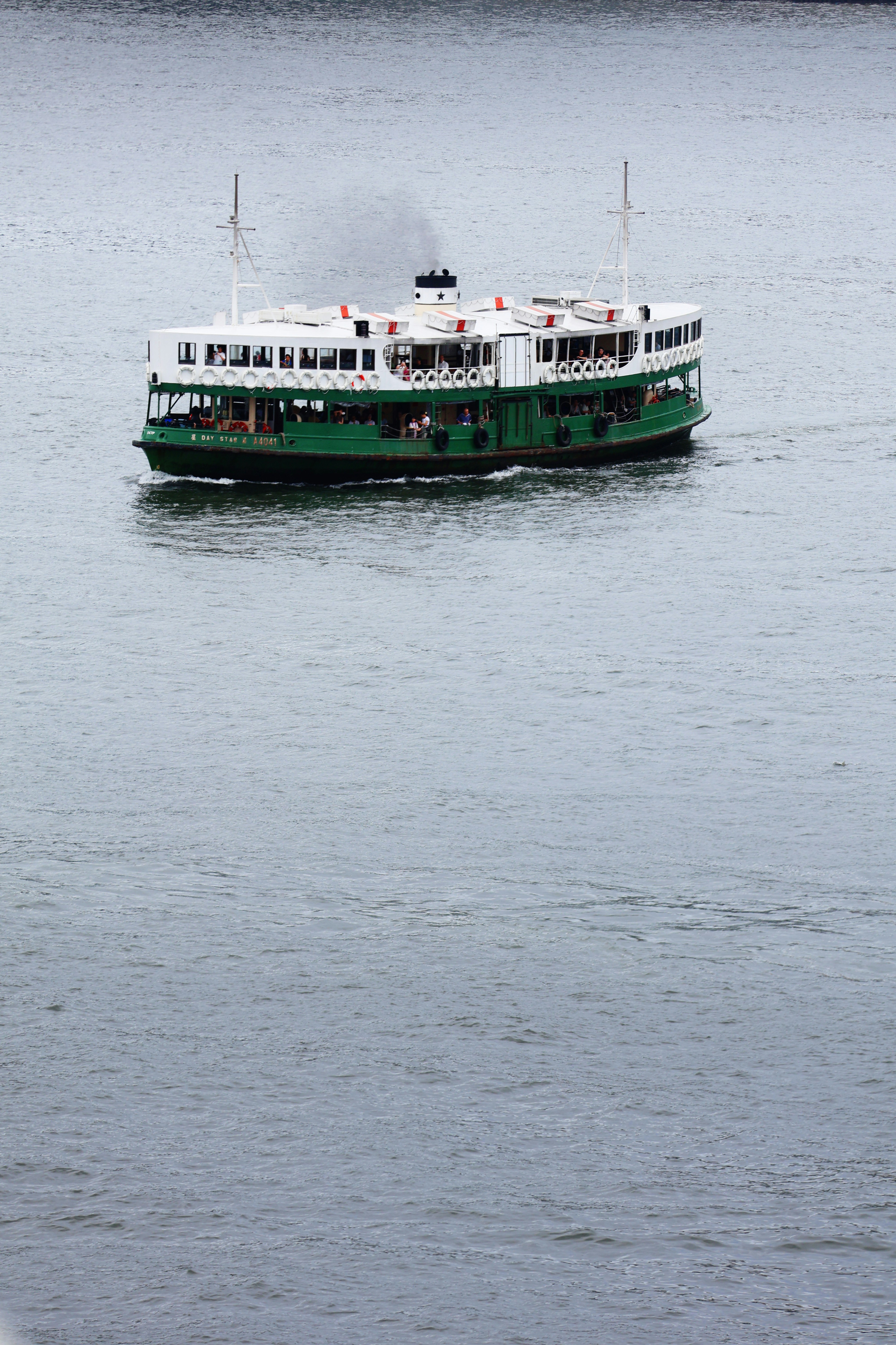 Emerald Vessel on Quiet Waters