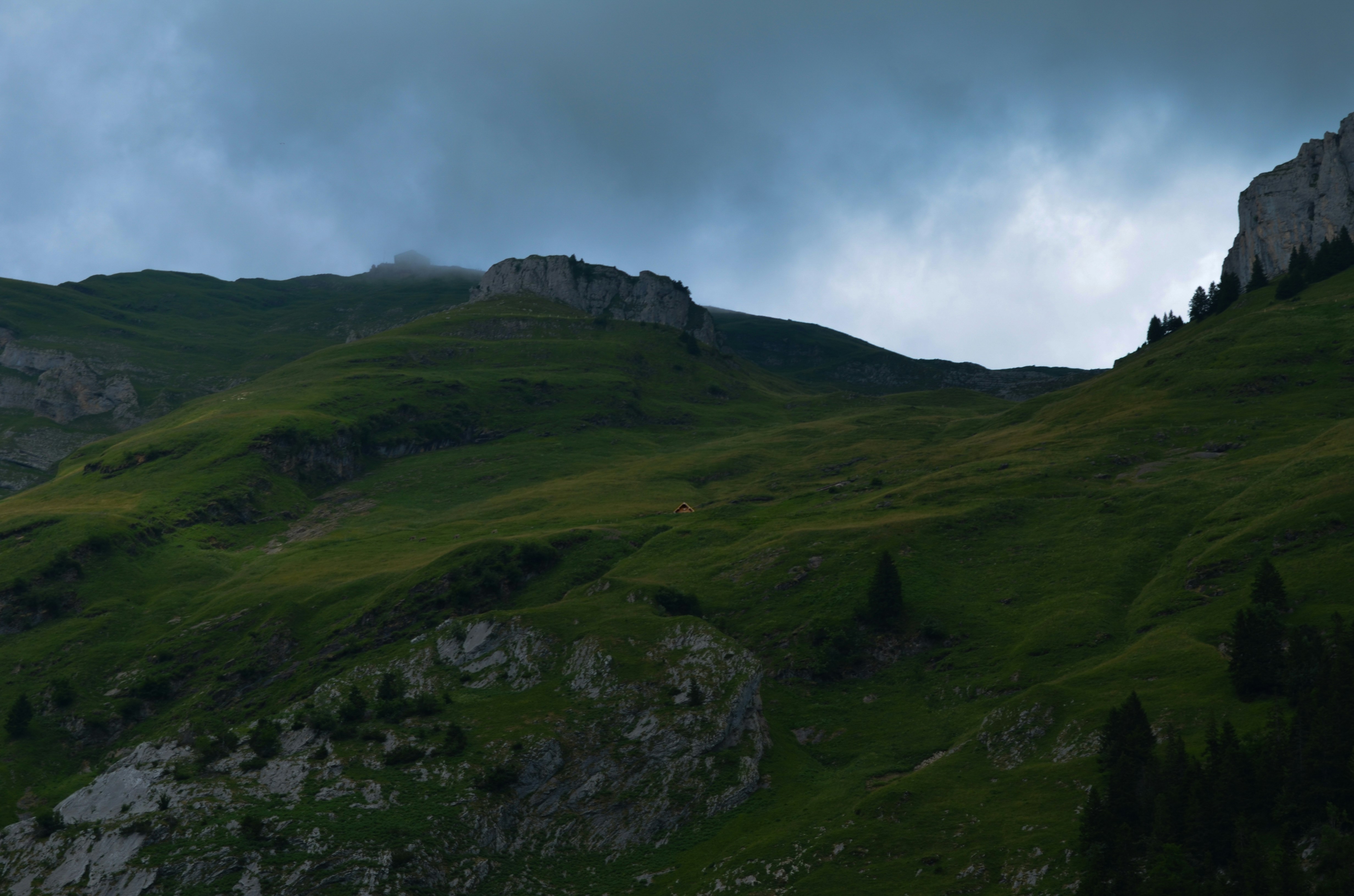 Green Ridge Beneath a Stormy Crest