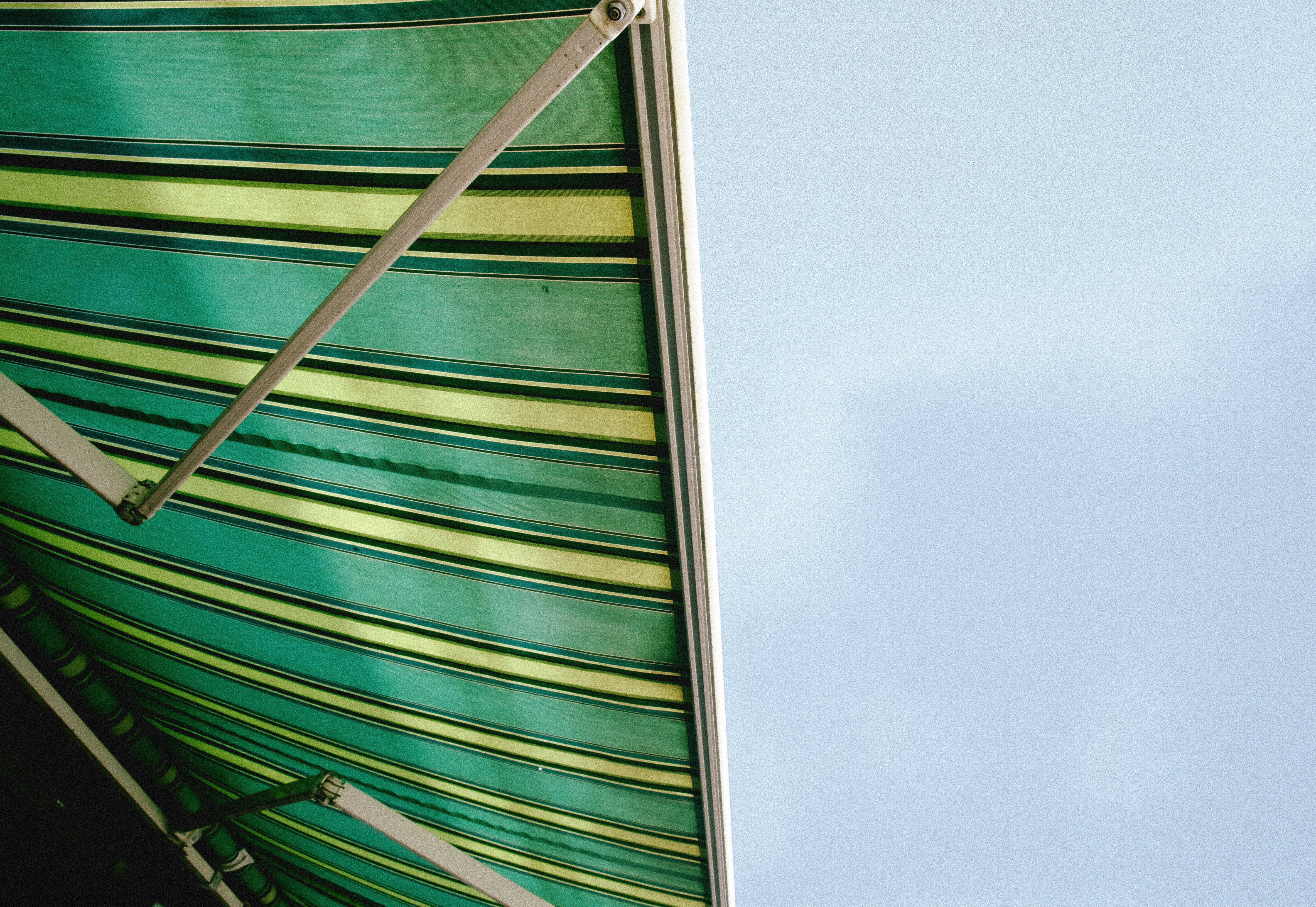 Green Stripes under a Tilted Canopy