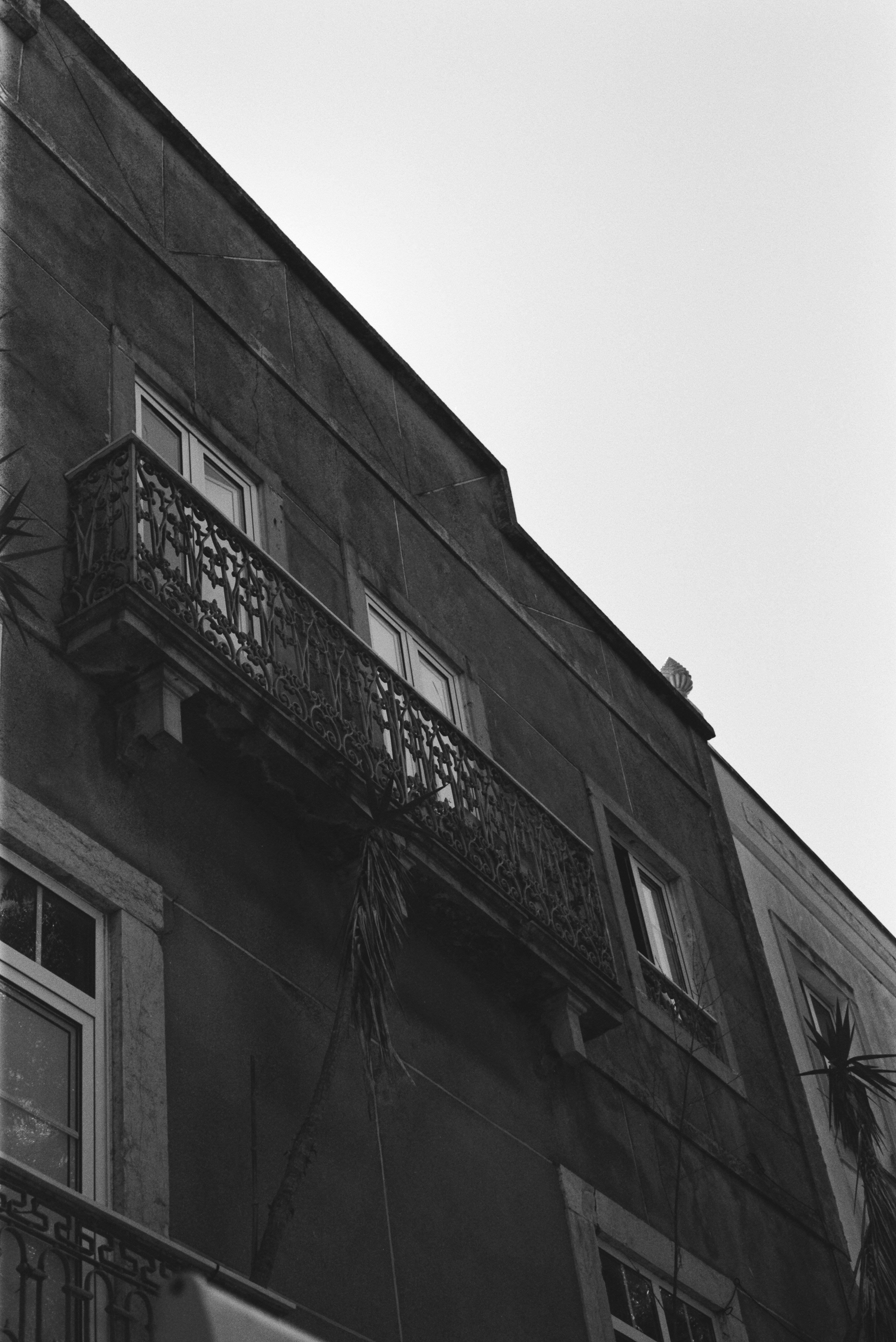 Angular Facade: A Dark Balcony and Architectural Lines