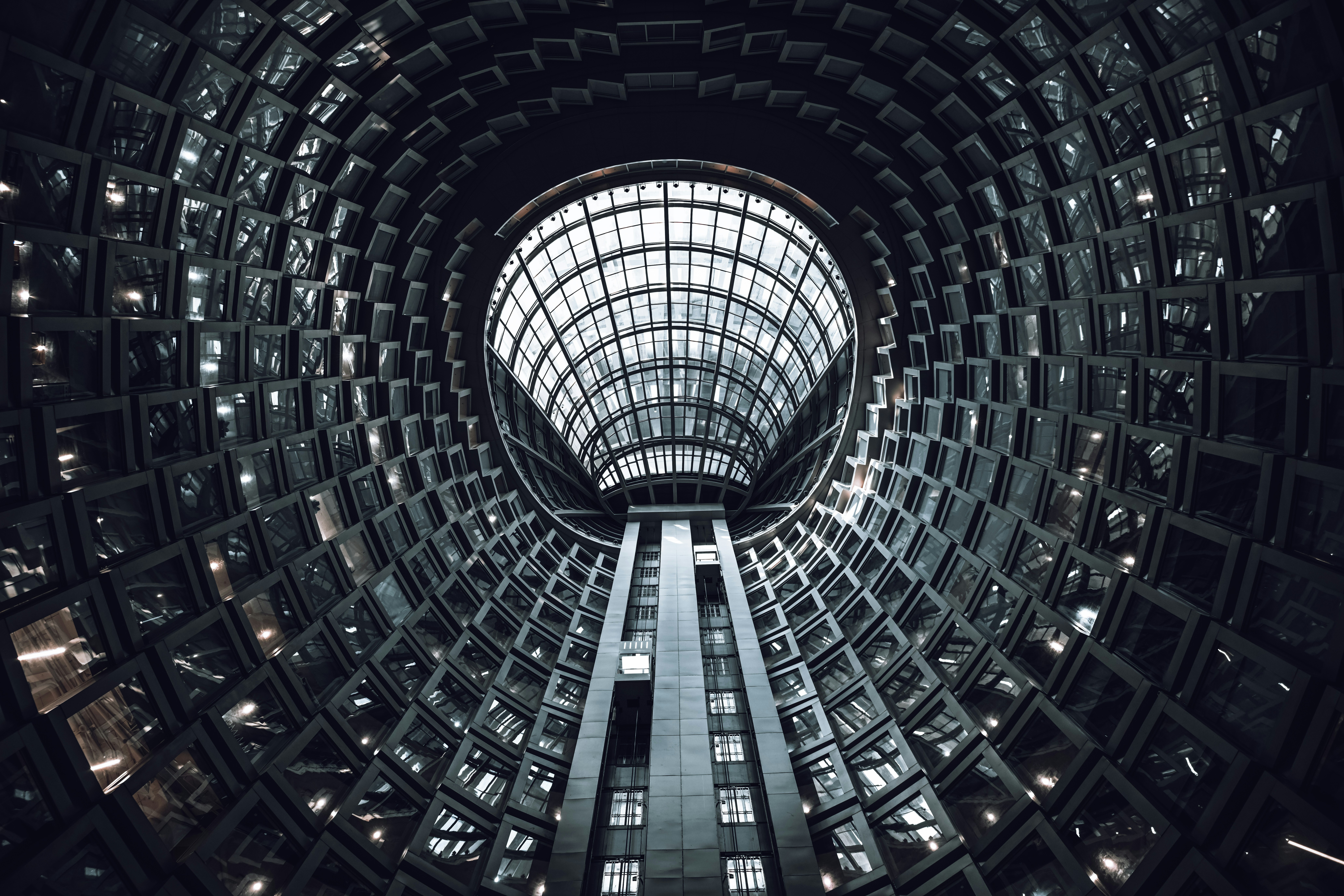 Concentric Atrium: Glass Dome Framing the Tower