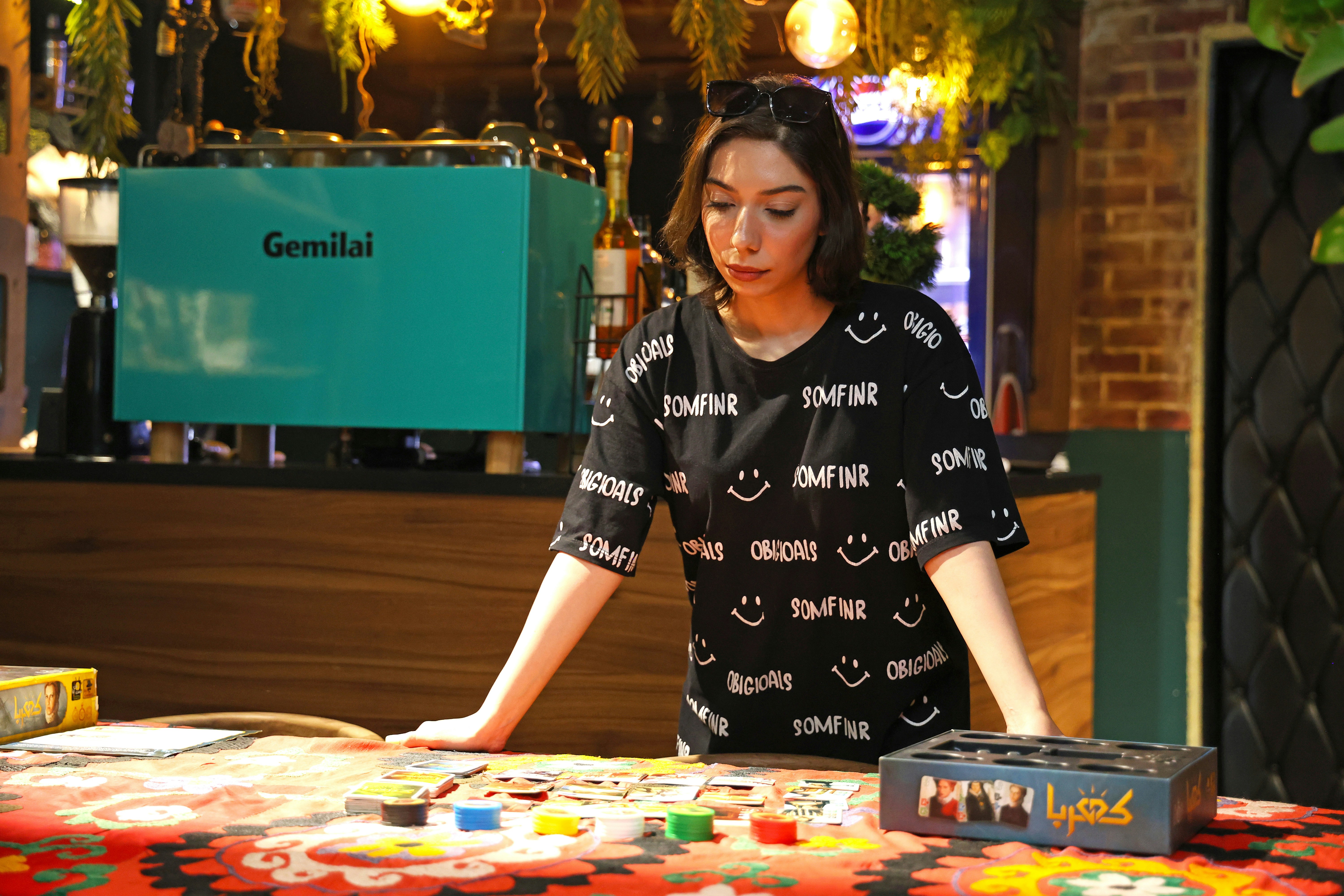 Dealer at Play: Focused Gambit in a Colorful Gaming Bar