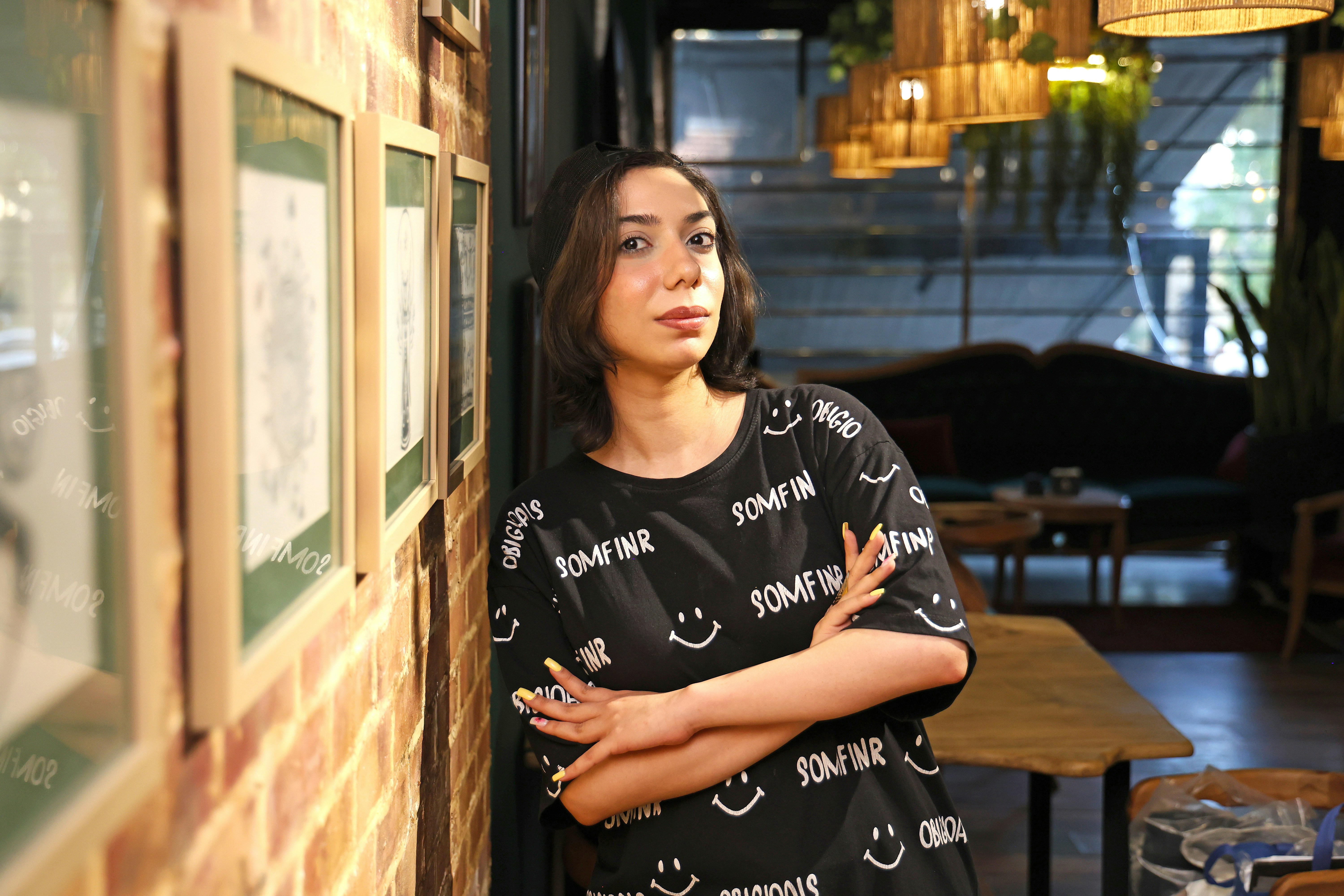 Casual Confidence at the Brick-Wall Café