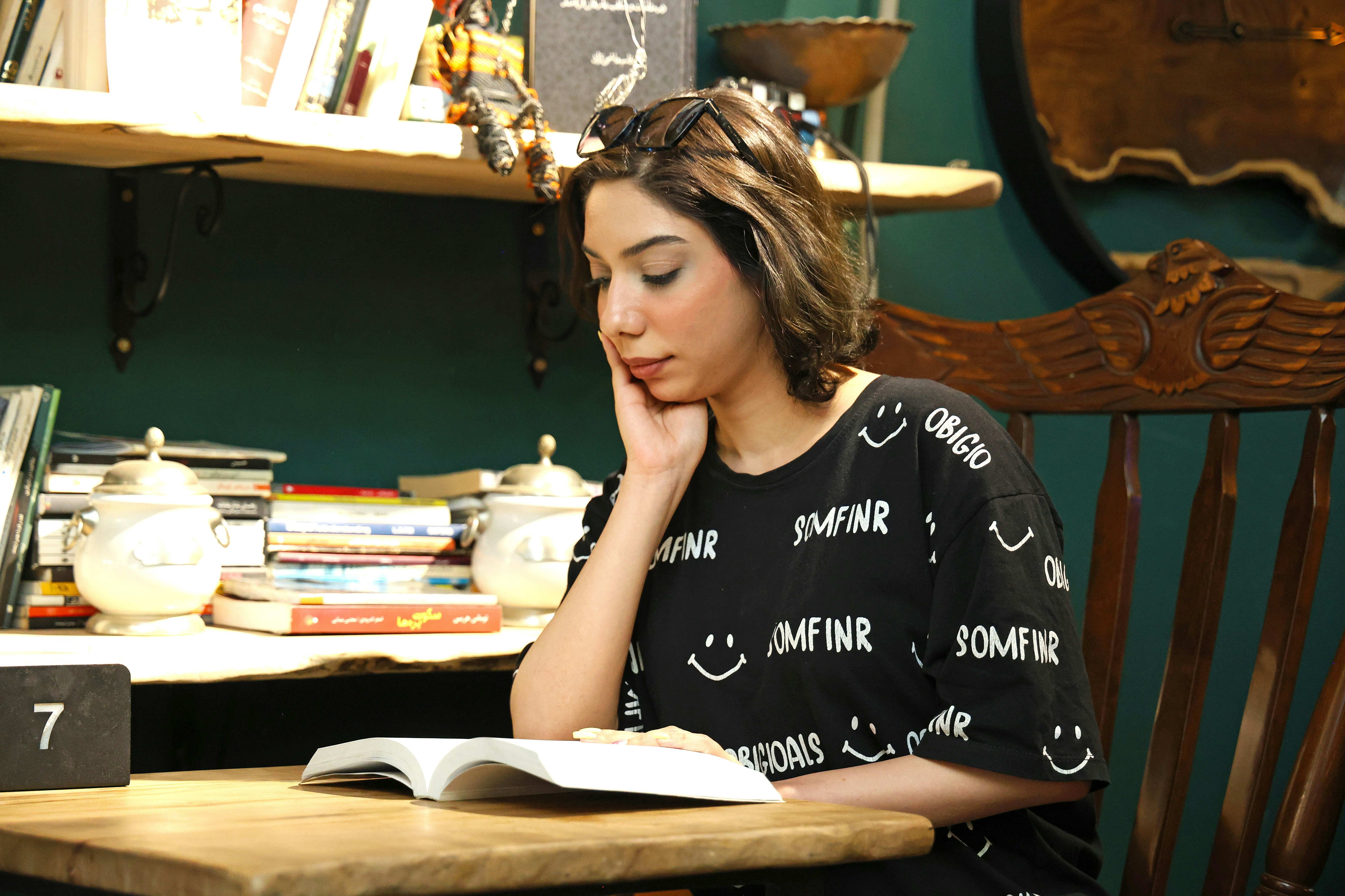 Midday Muse: Reading at the Corner Table