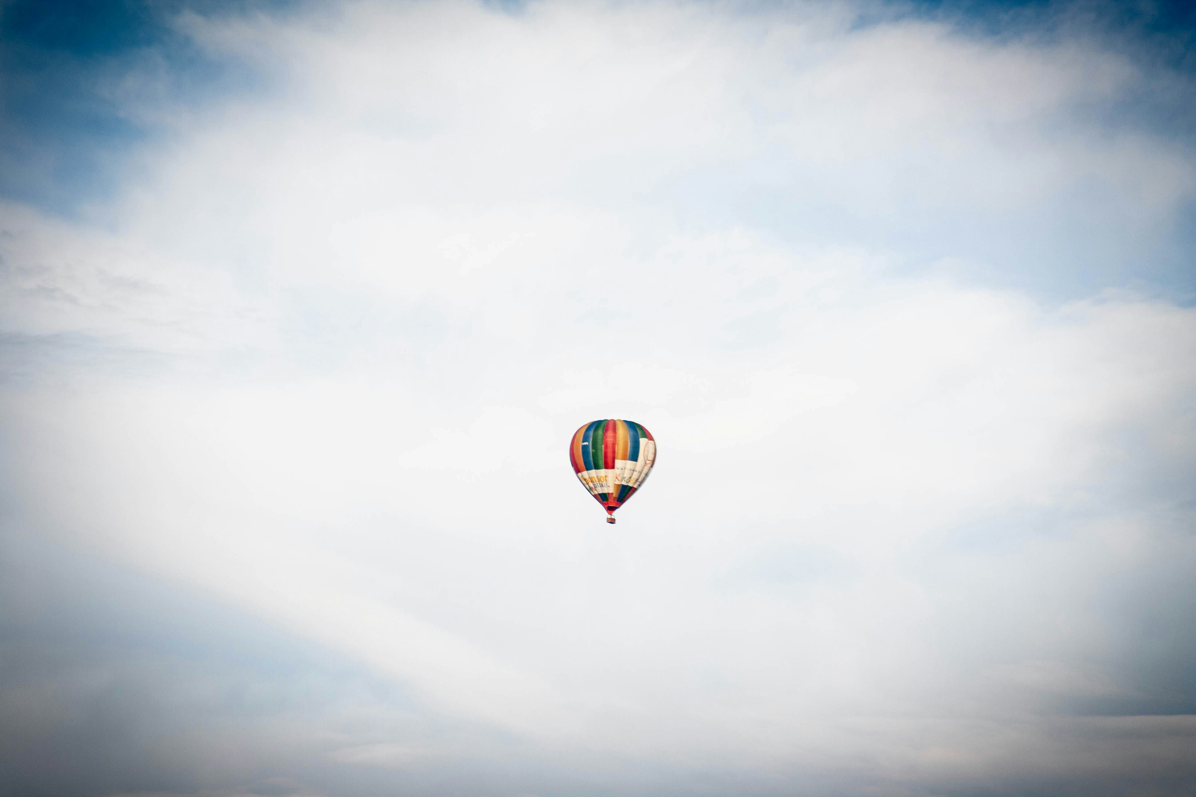 Balloon Against a Quiet Sky: A Solo Descent into Soft Clouds
