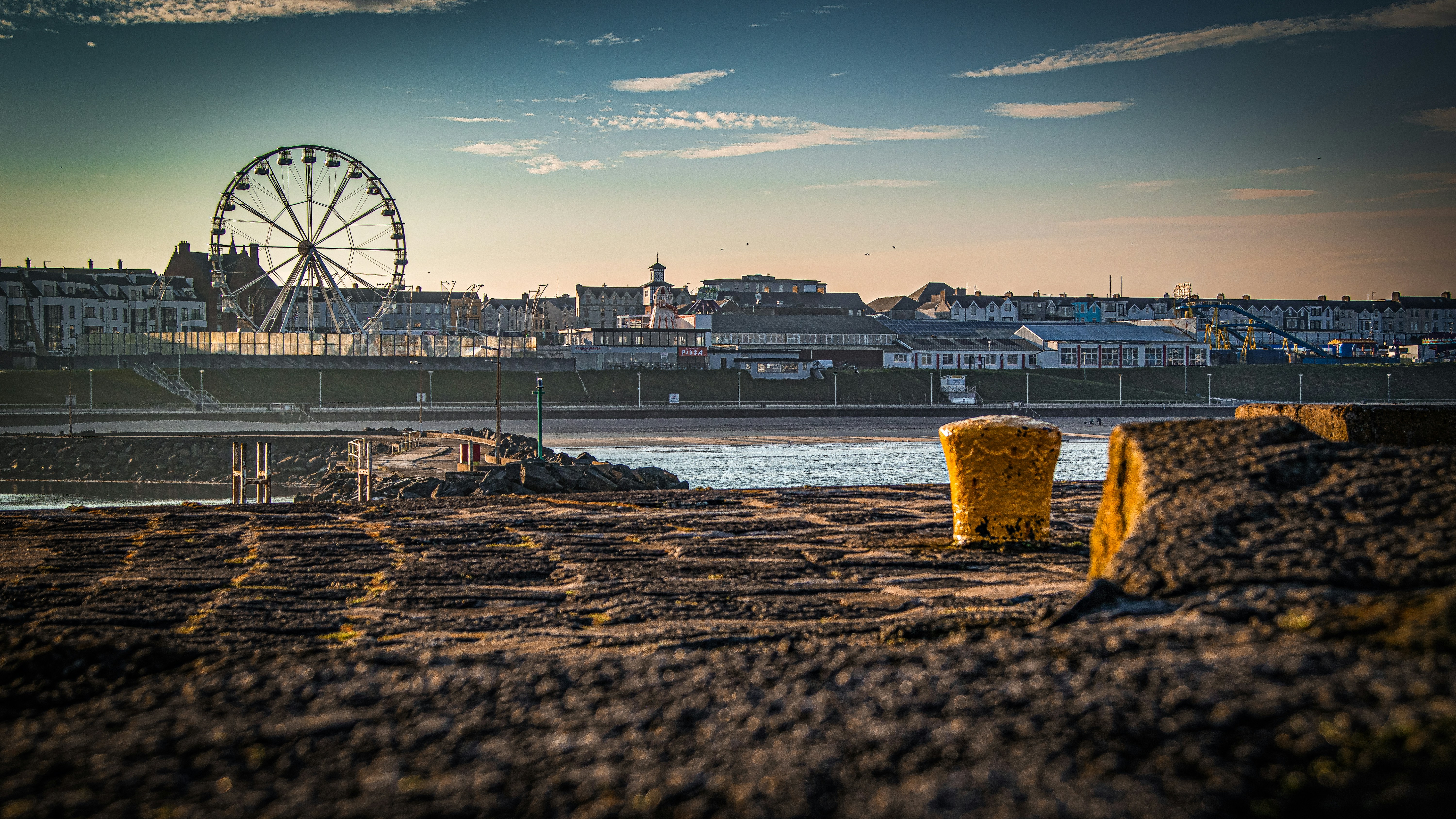 Jetty Stones and the Distant Ferry Wheel